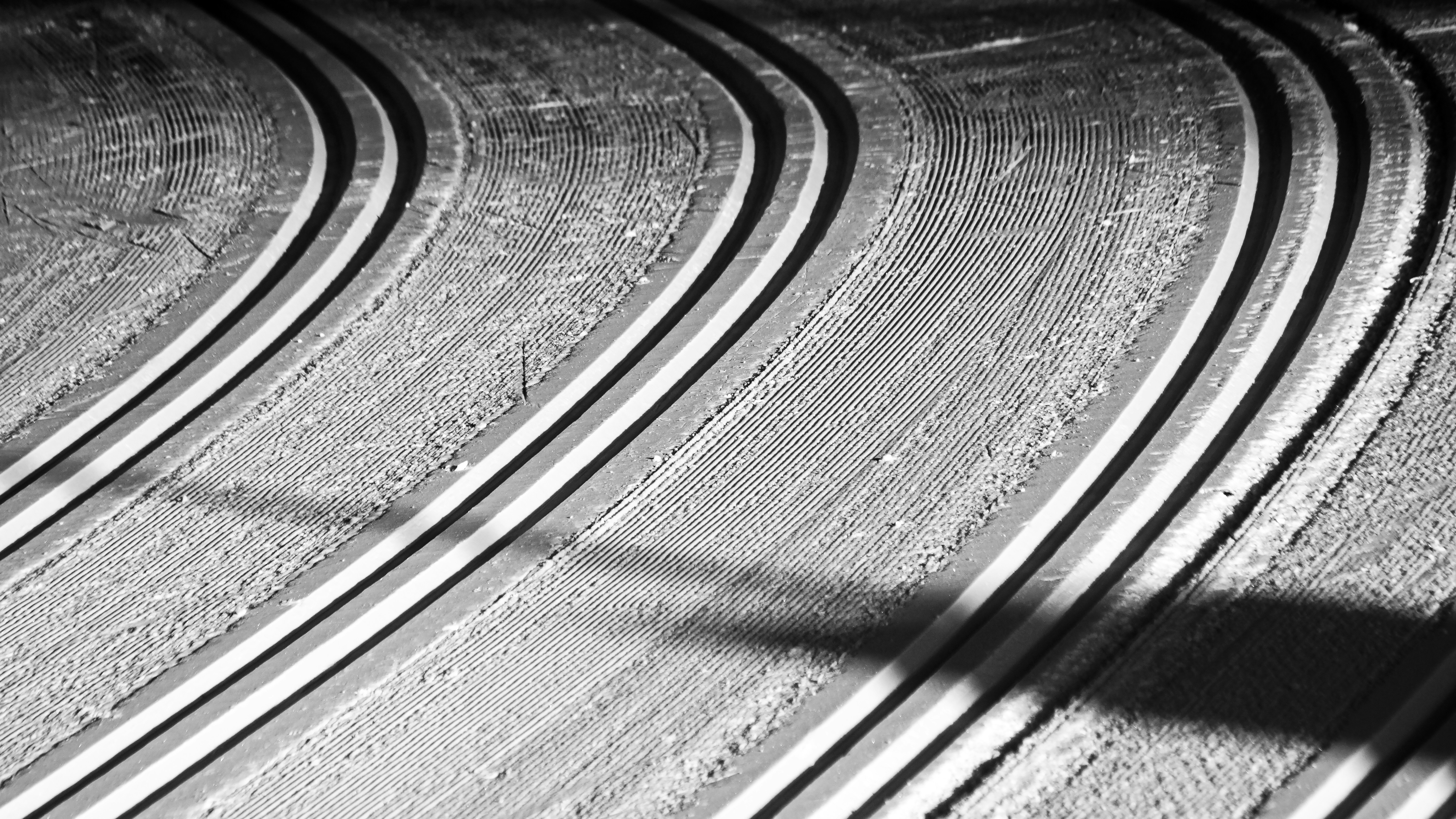 Converging Rails in Monochrome: A Quiet Study of Line and Shadow