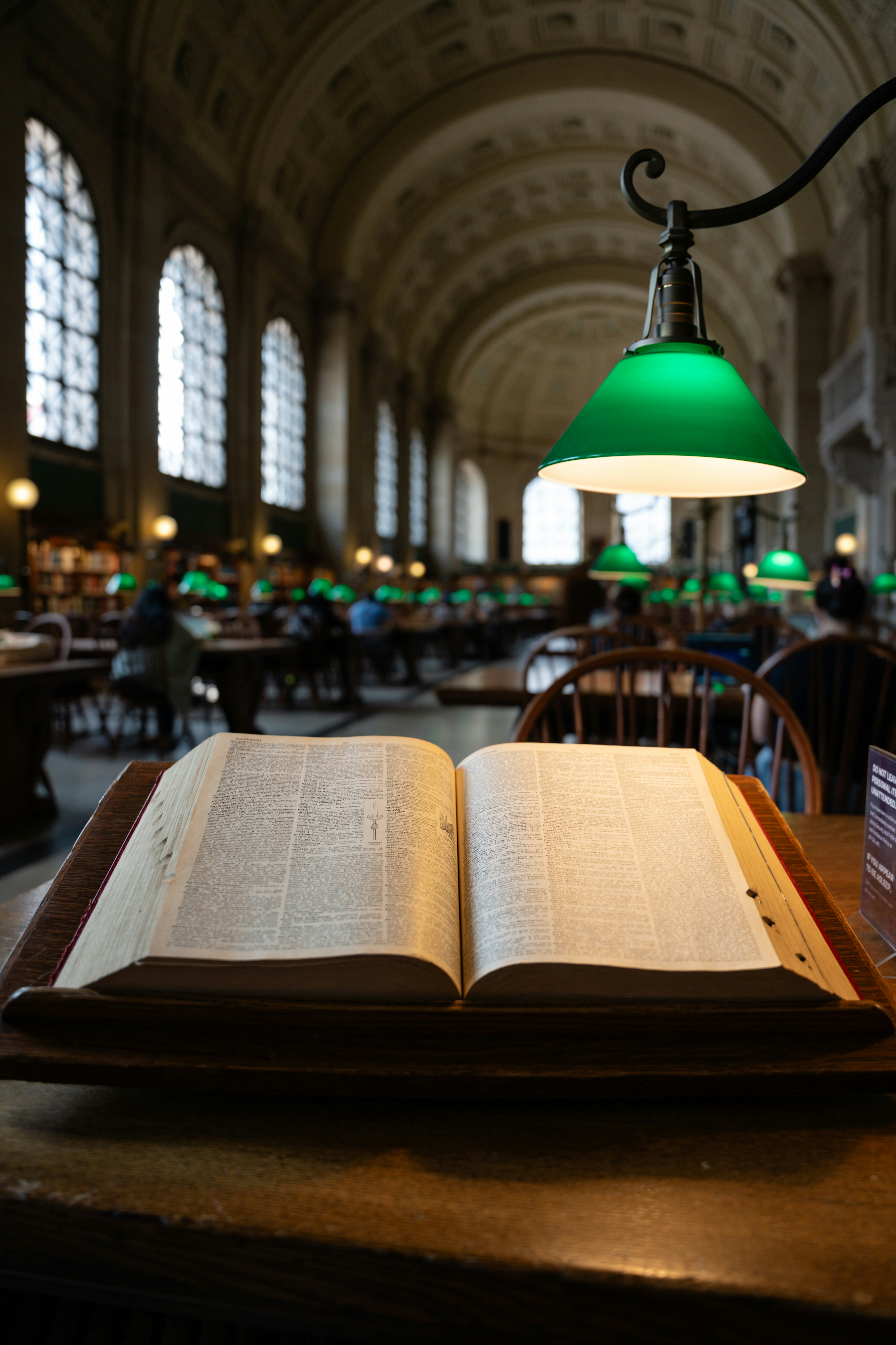 Open book on a table in a library
