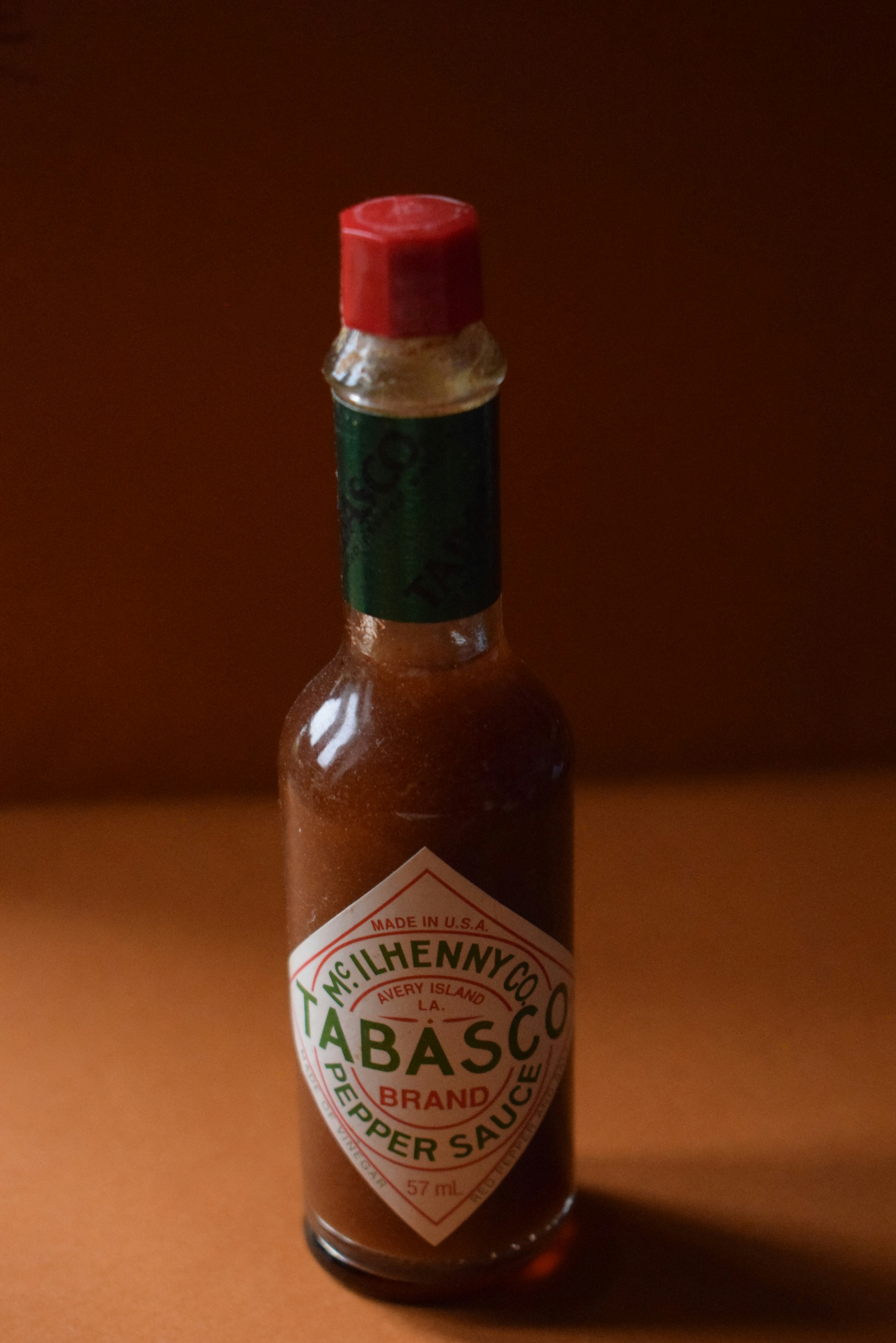 A bottle of tabasco brand pepper sauce.
