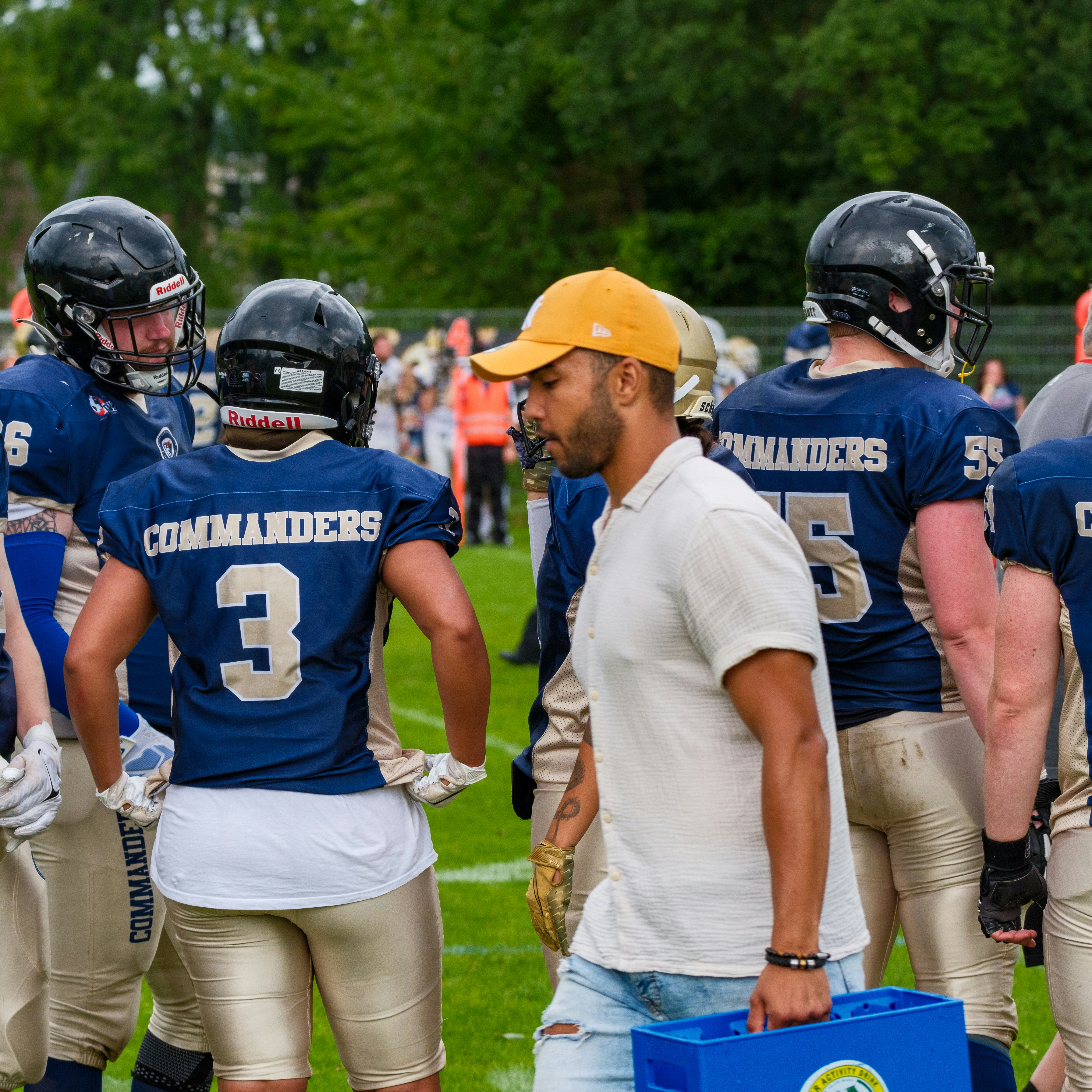 Orange Cap at the Chalkline: Commanders' Sideline Moment