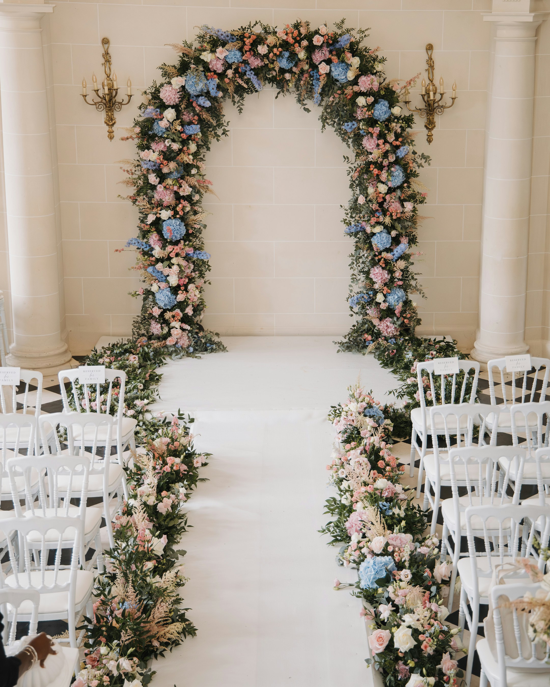 Floral Arch Ceremony Aisle — Soft Pastels and White Runway