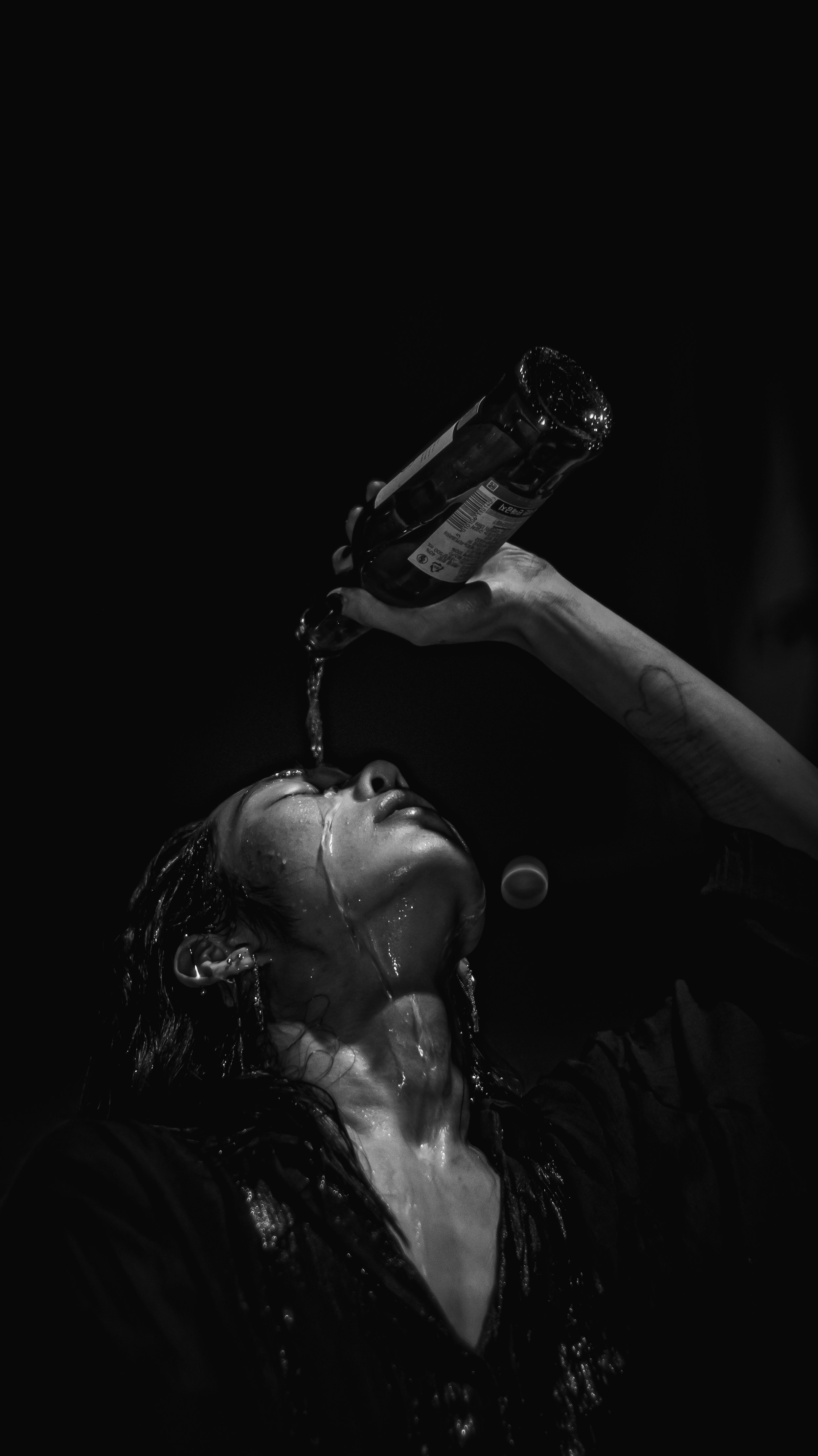 Pouring Night: A Bottle Soaks the Silence