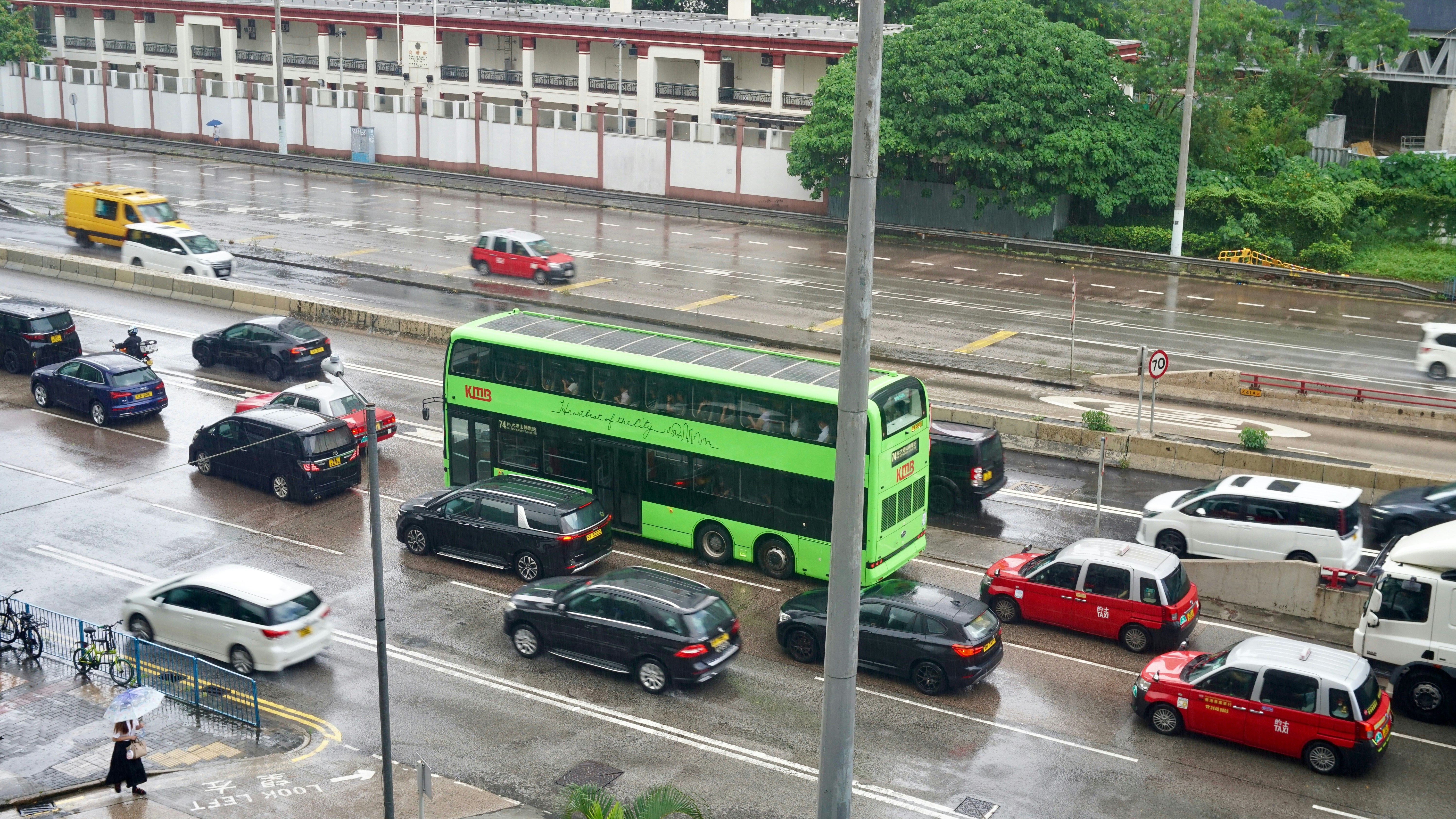 Emerald Transit Amidst Urban Chaos