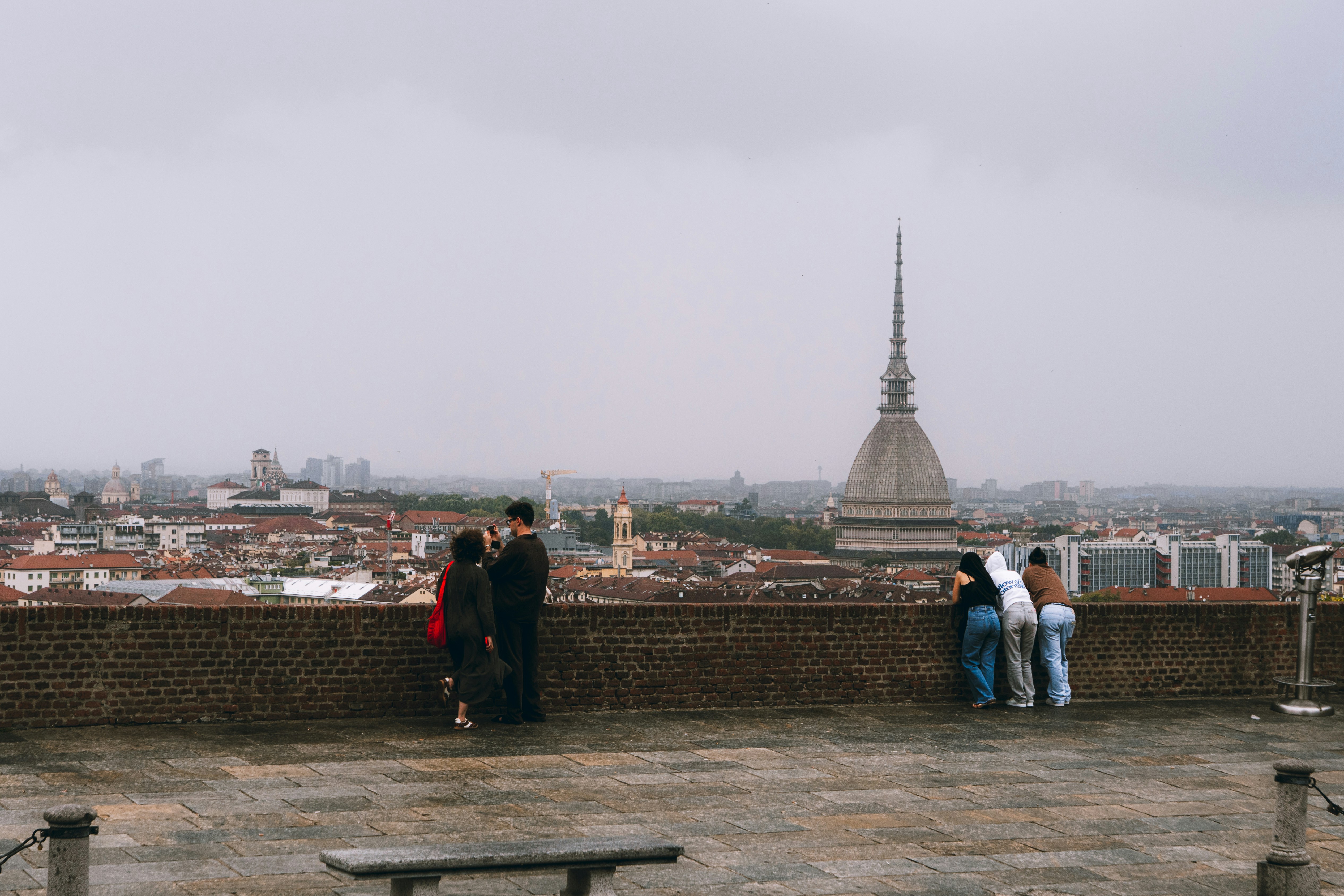 Rooftop Contemplation Over a Quiet Cityscape