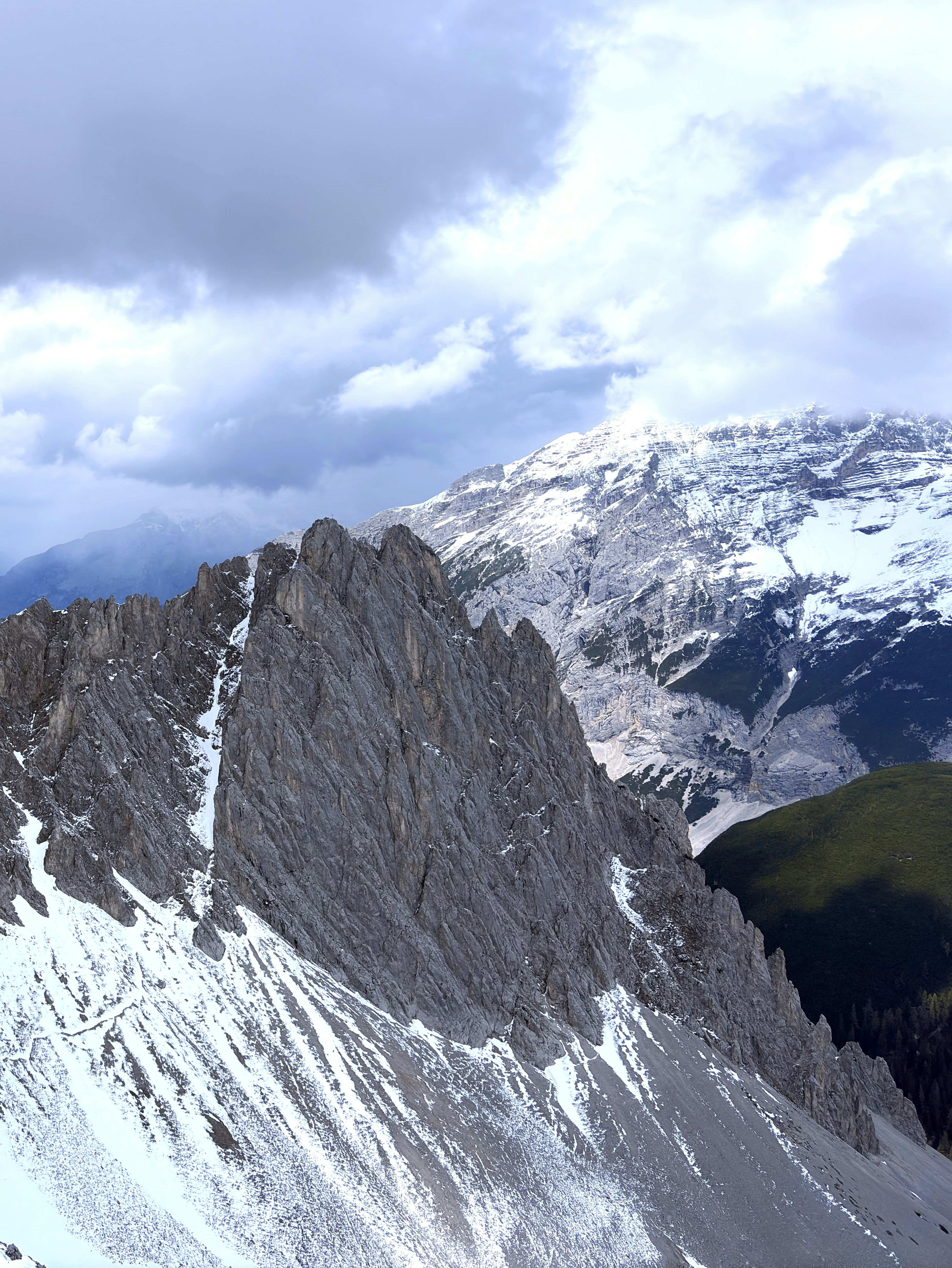 Snowy Mountains in Innsbruck, Austria | Jagged mountain peaks with snow and clouds