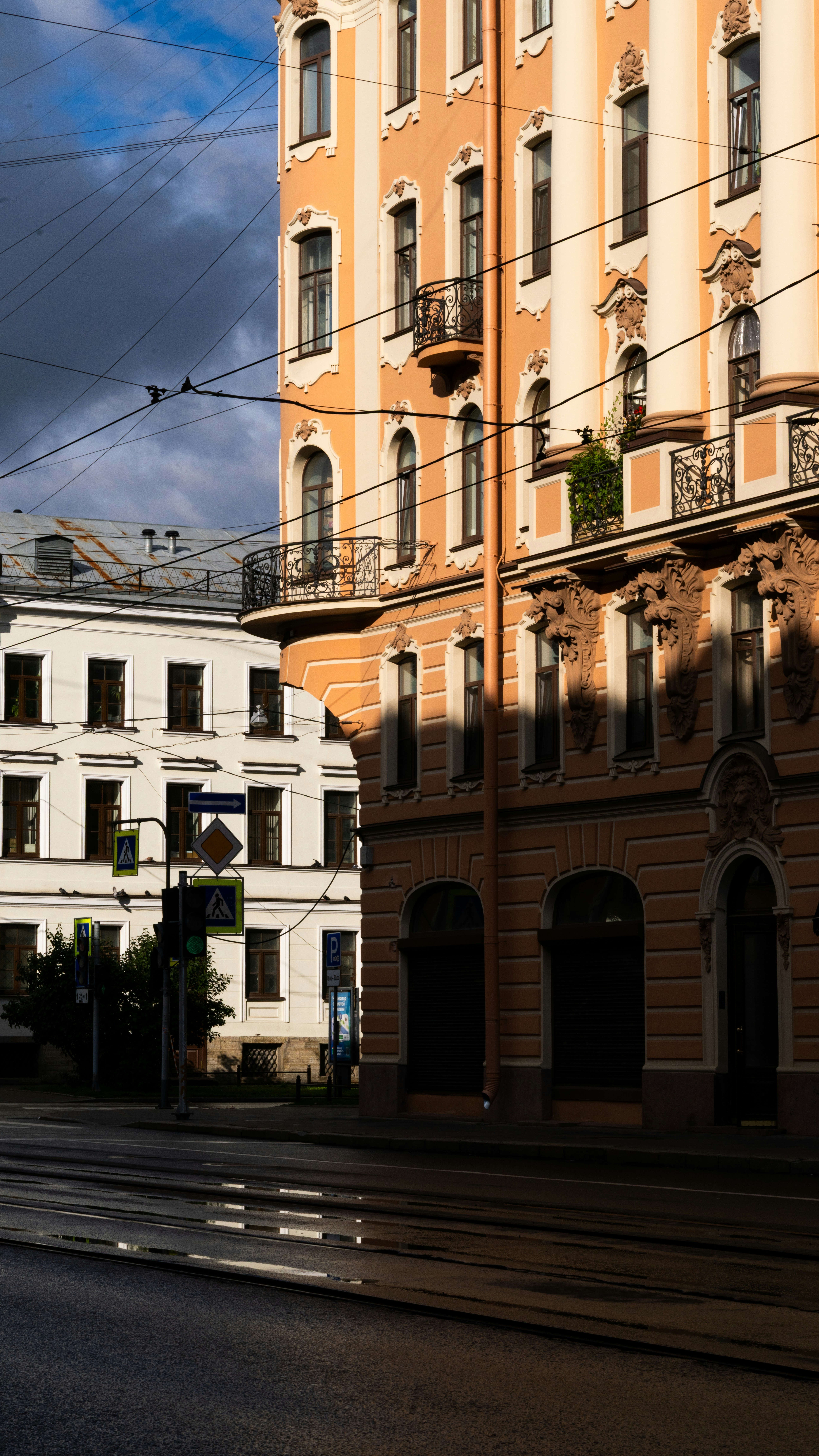Ornate buildings with tram tracks in foreground.