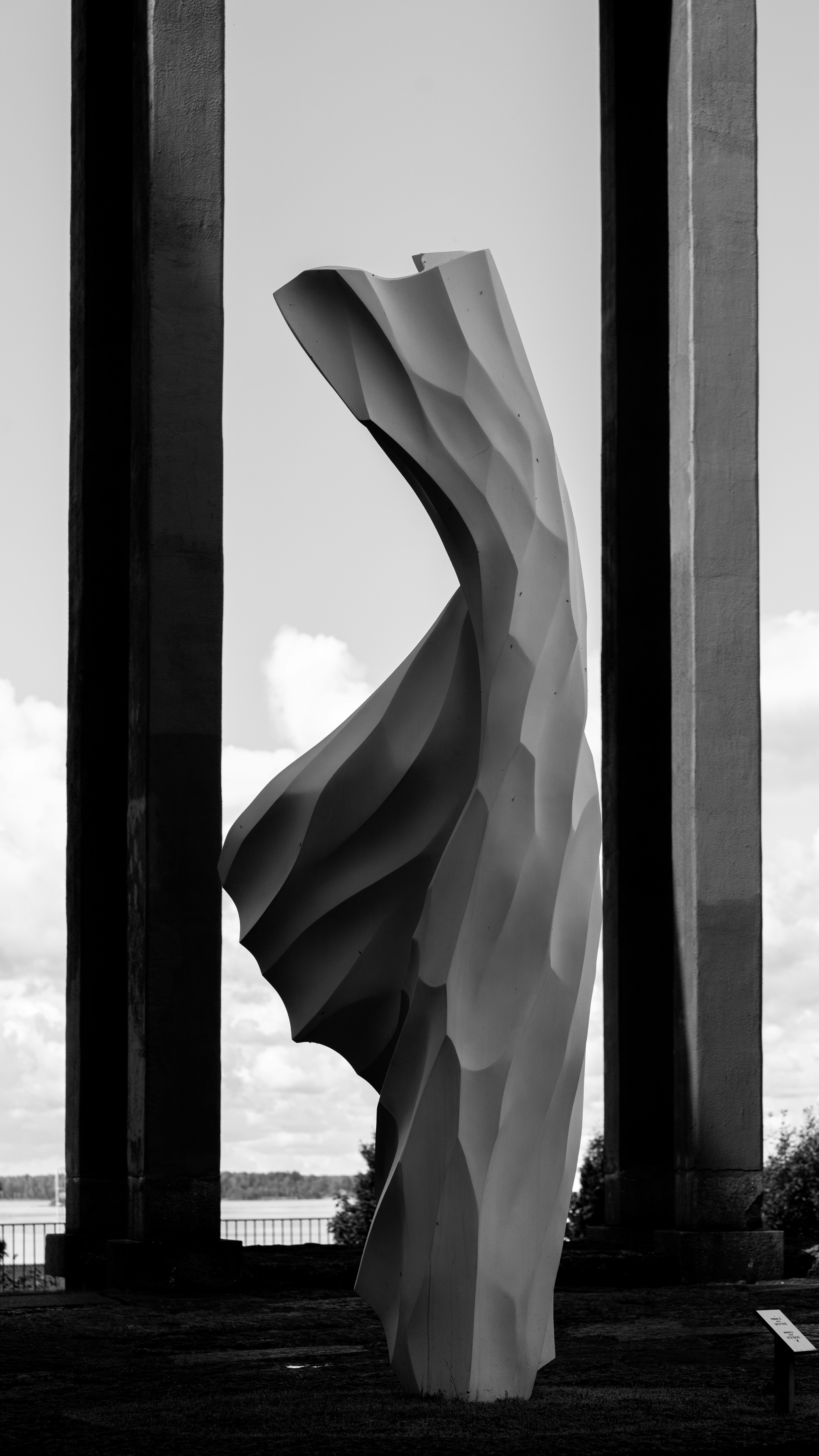 Sculpted Spiral Between Columns