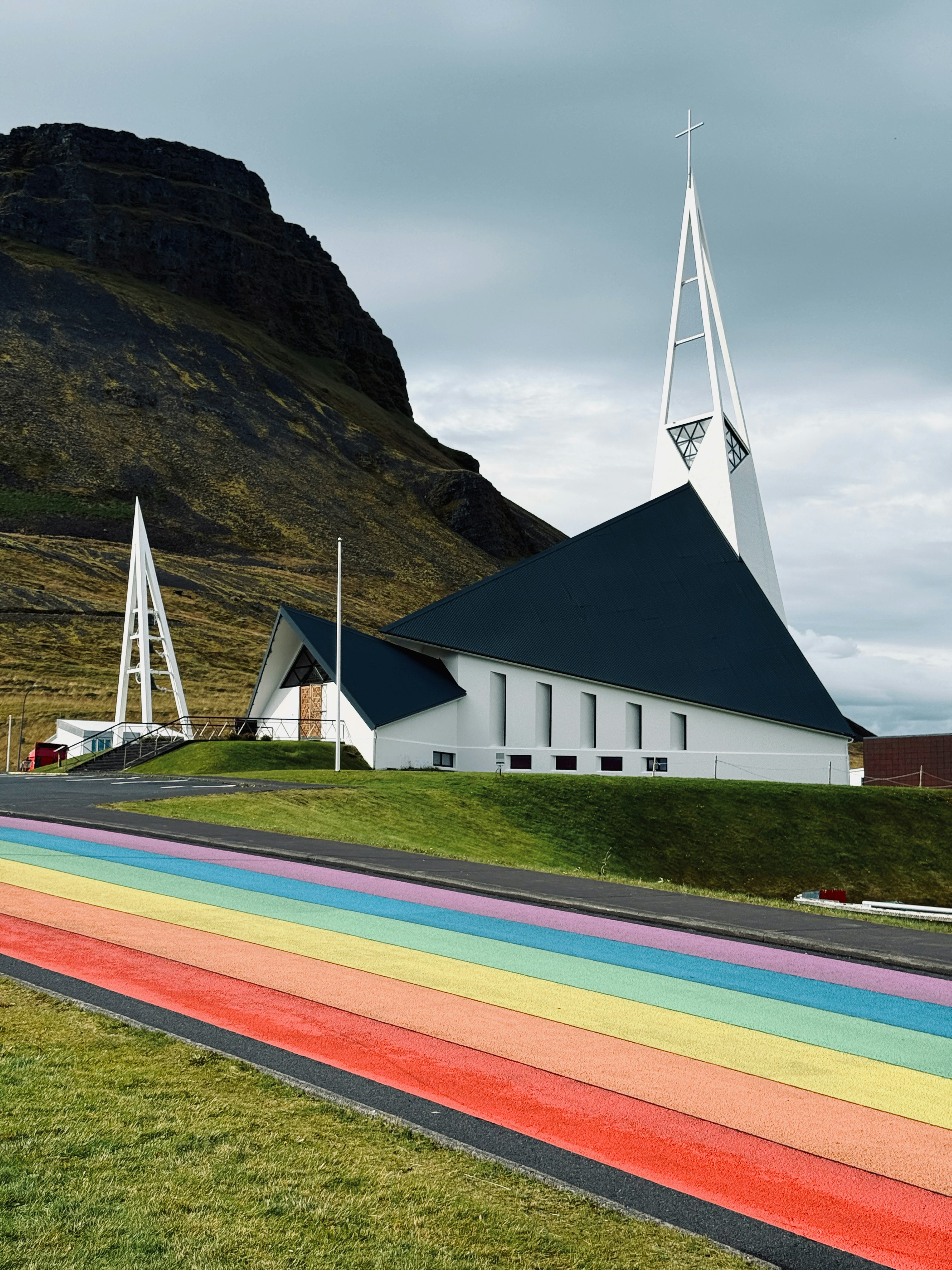 Modern Chapel with Rainbow Runway under a Ledge and Sky