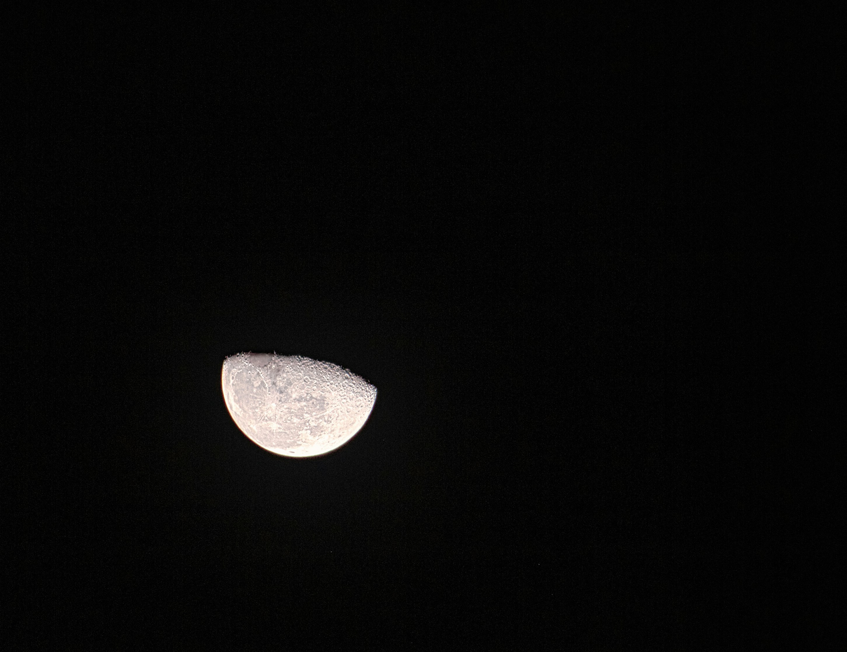 Lunar Serenity: A Glimpse of the Half Moon