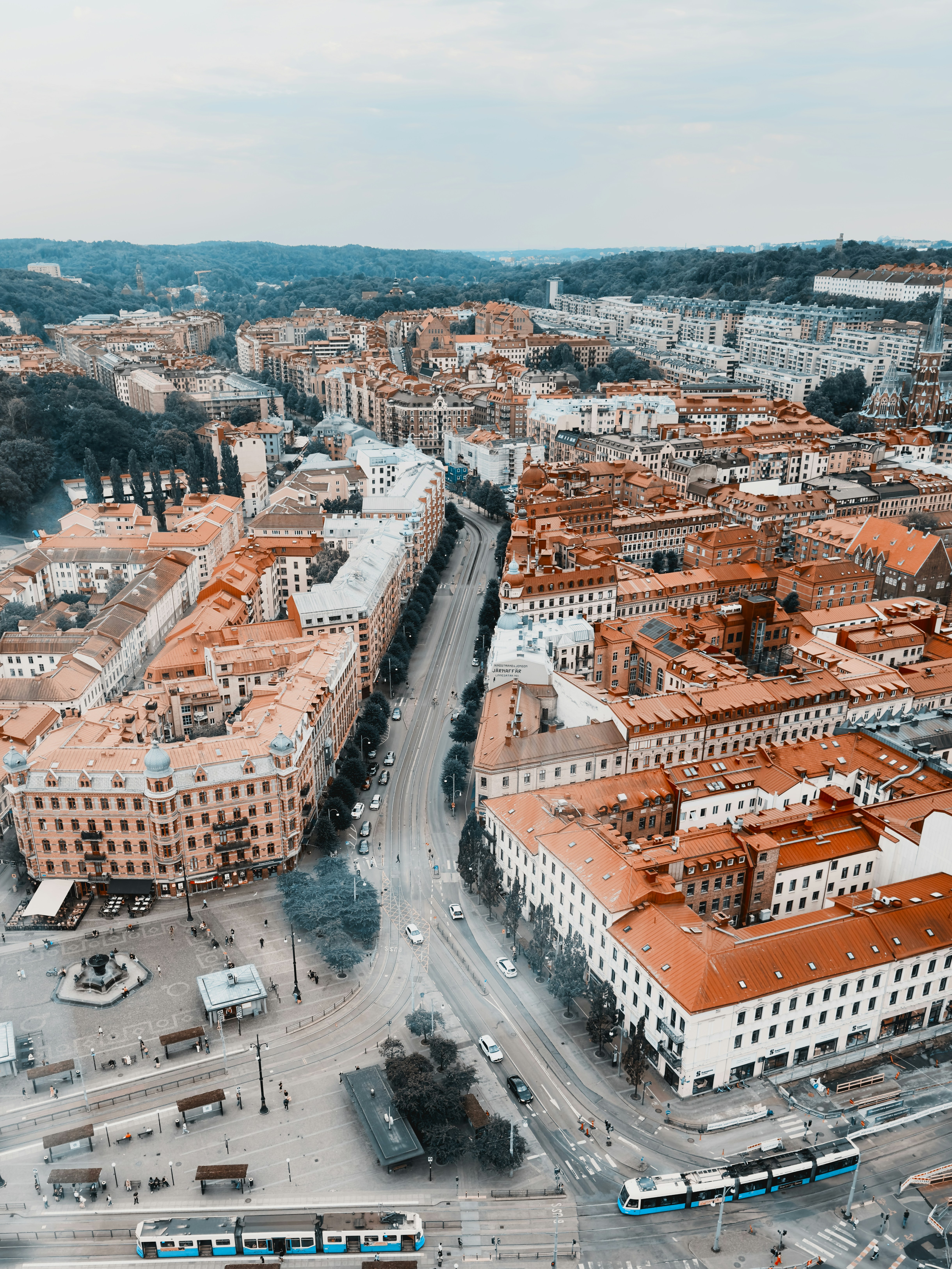 Aerial view of a european city with trams and buildings.