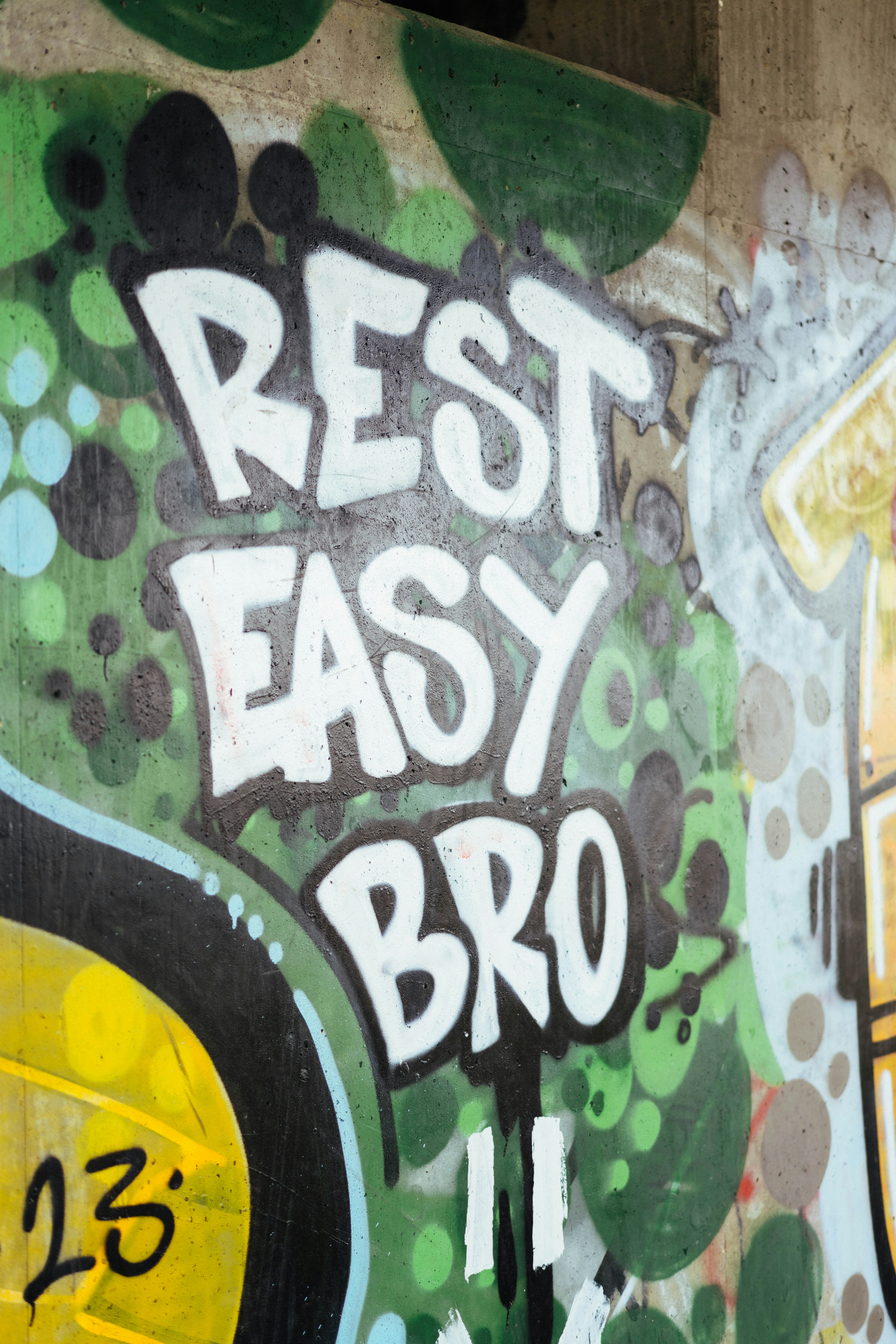 Graffiti on a wall reads "rest easy bro" photo – Free Image on Unsplash
