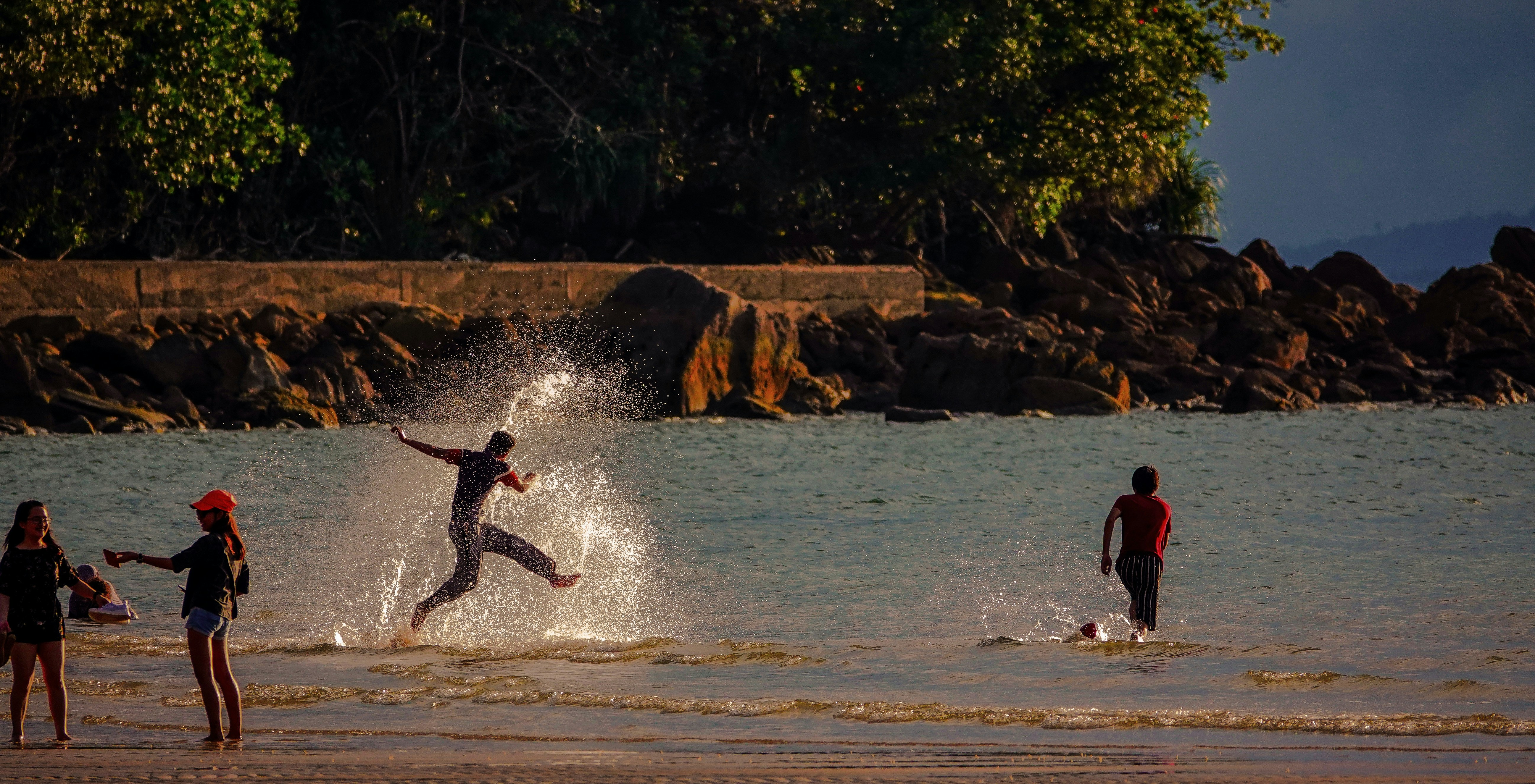 Joyful Splashes at Sunset