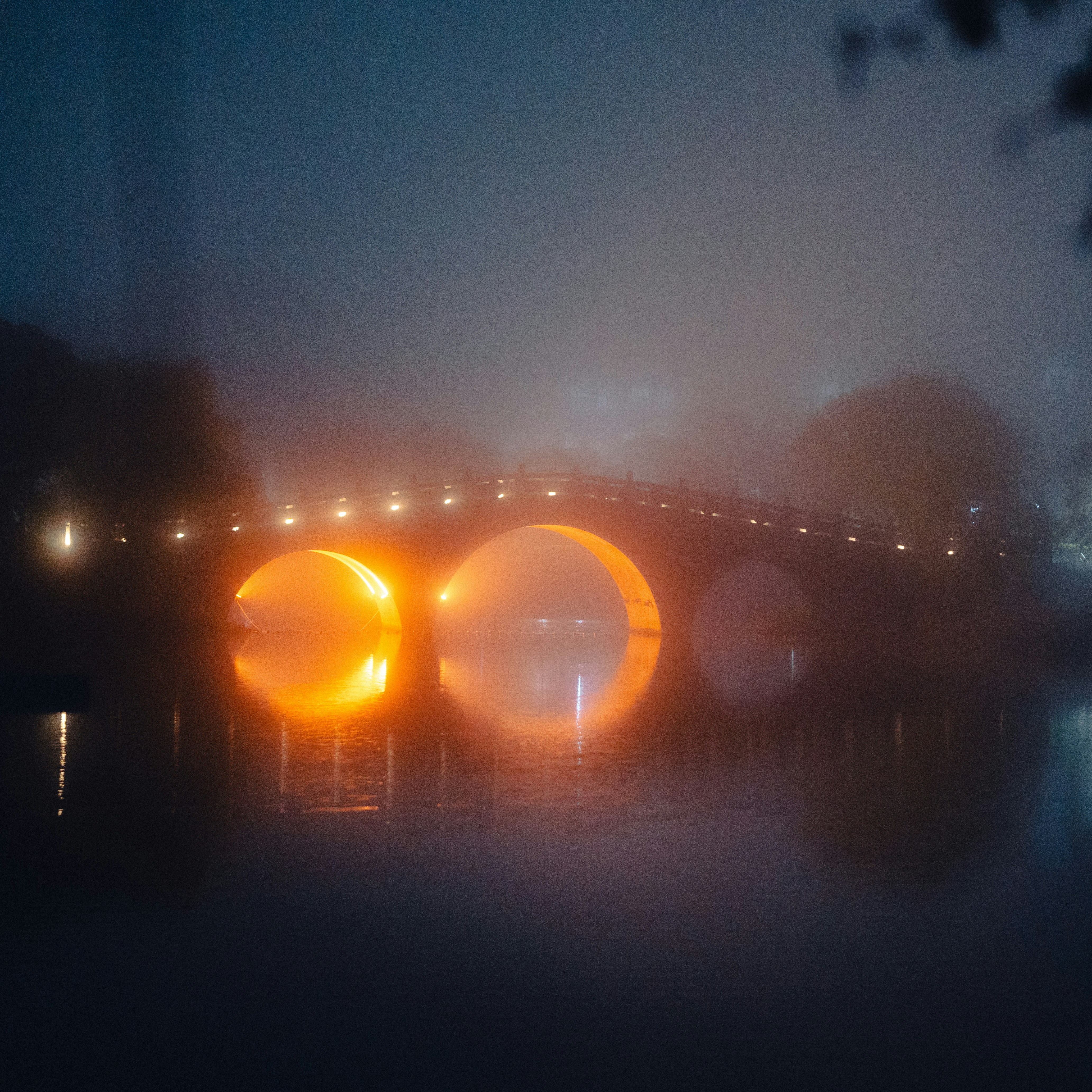 Ethereal Glow: A Bridge in the Mist