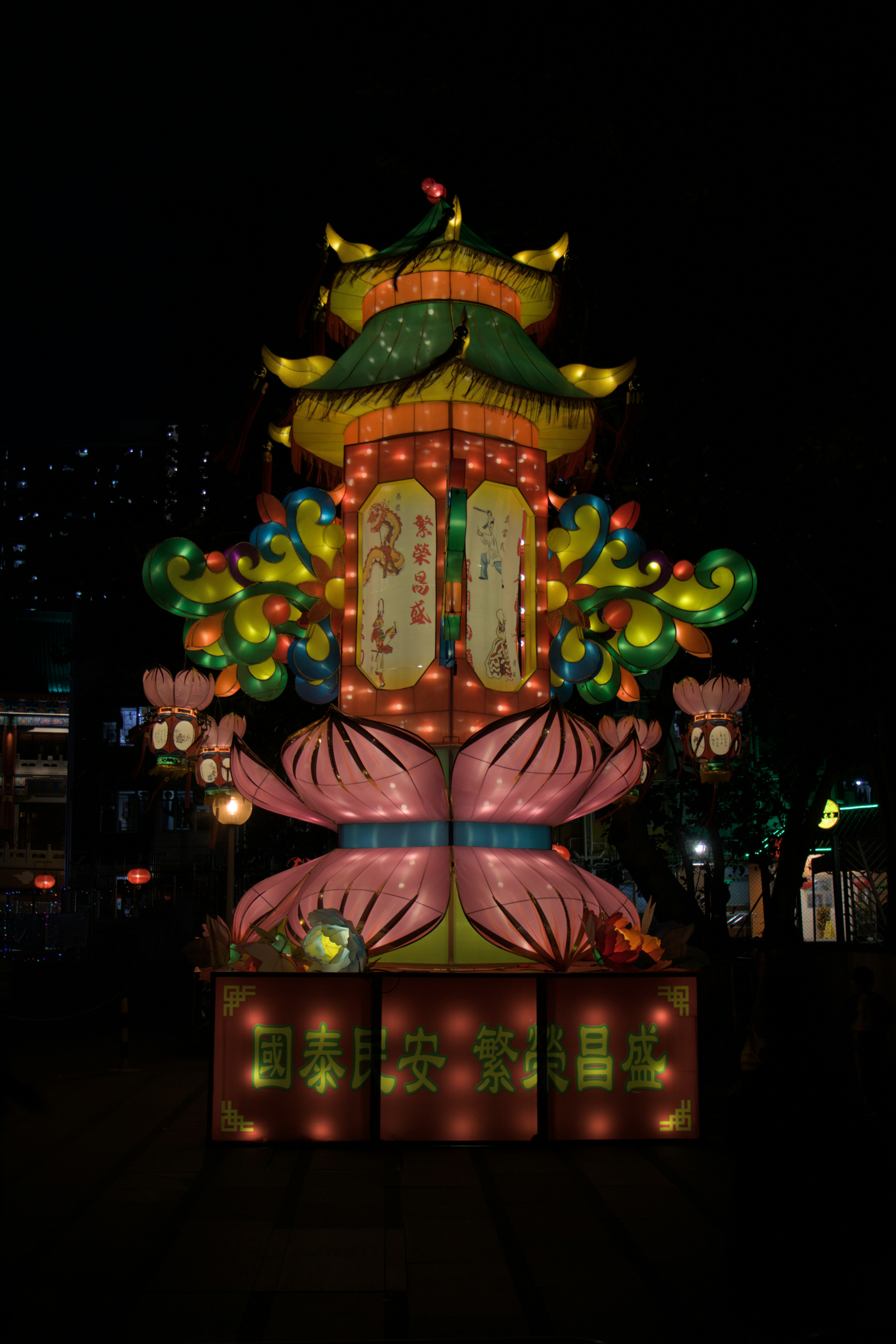 Ornate illuminated lantern display at night