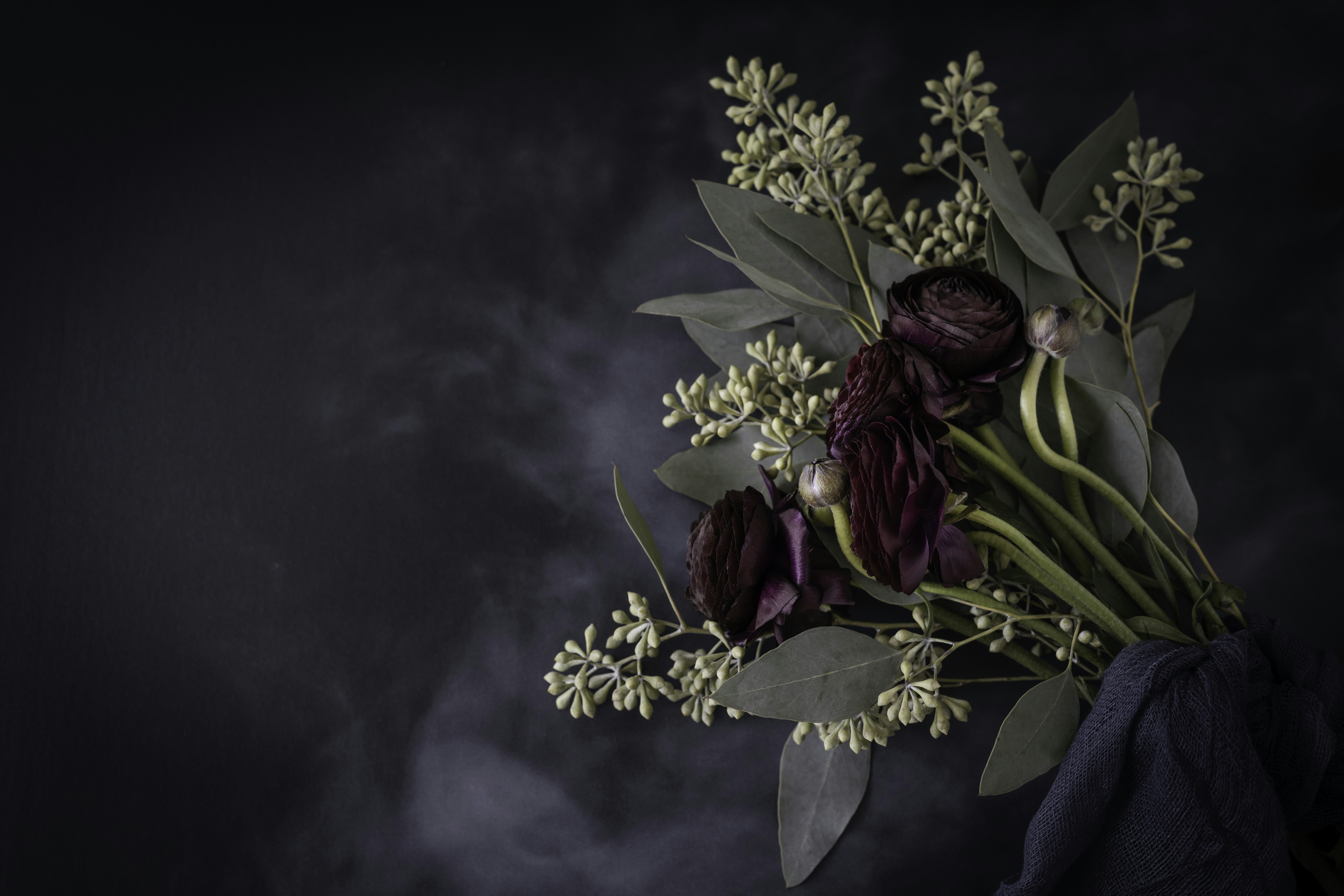 Whispers of Elegance: A Floral Arrangement in Shadow