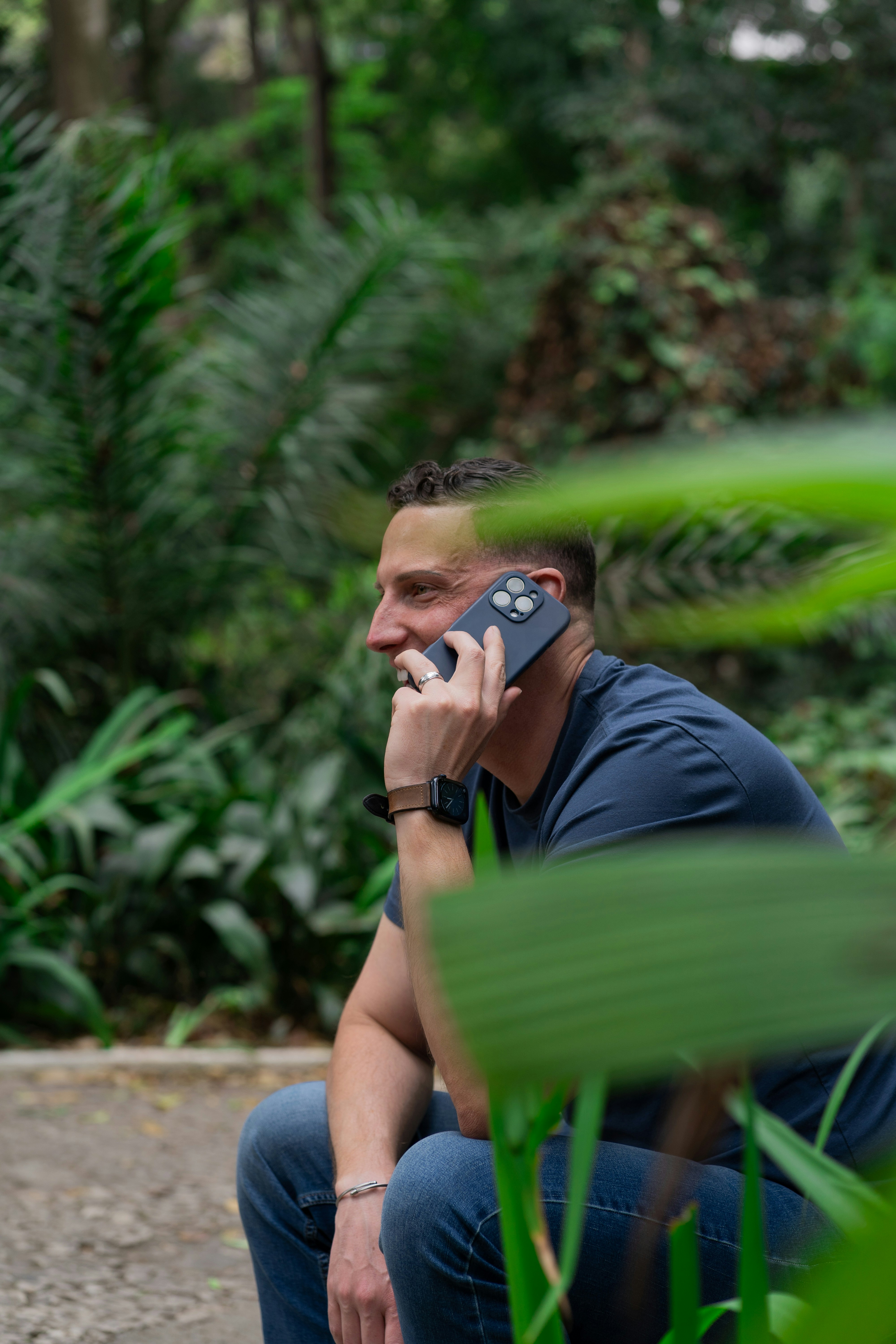 Quiet Call in the Greenroom: Portrait Amid Foliage