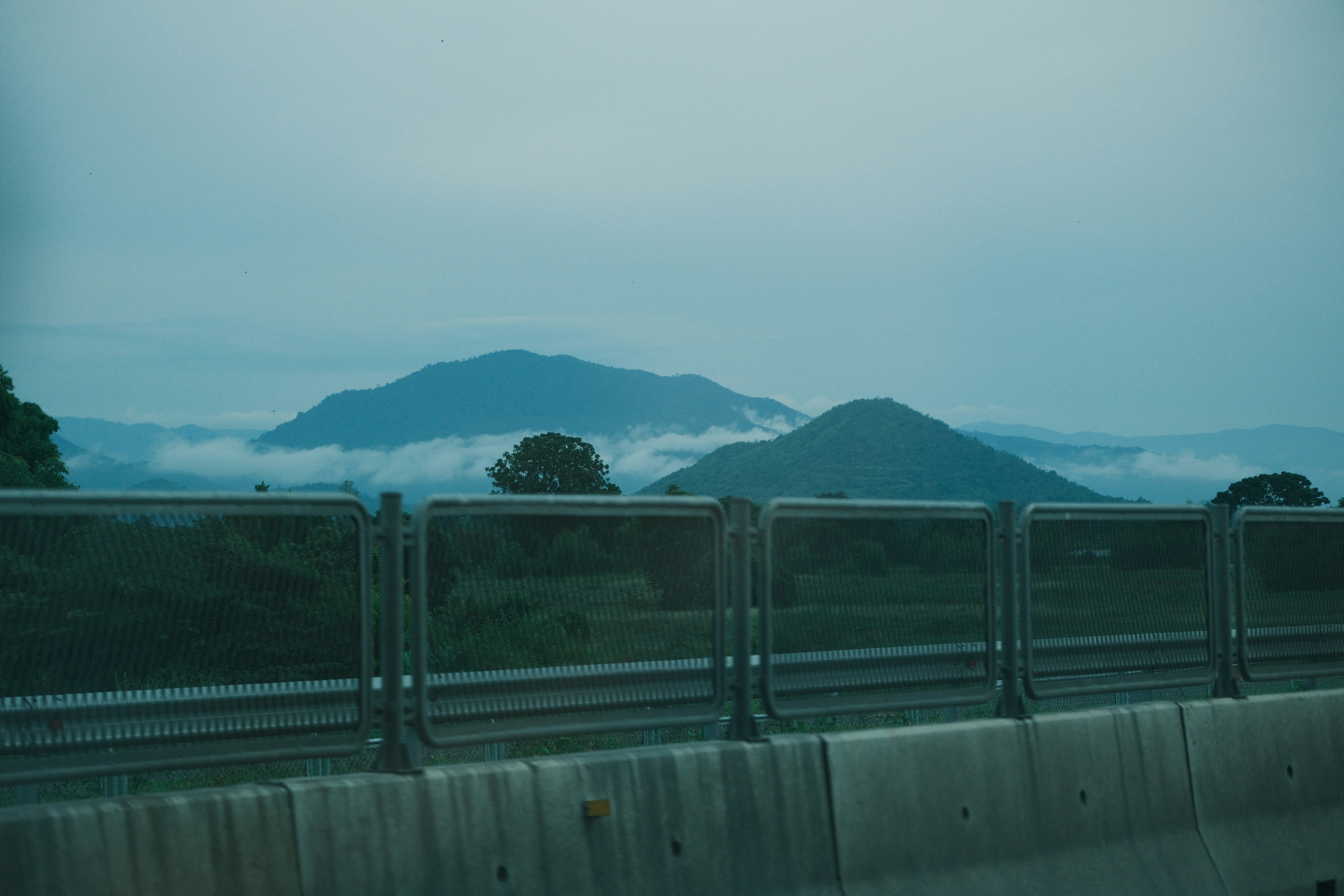 Veiled Peaks: A Journey Through Misty Horizons
