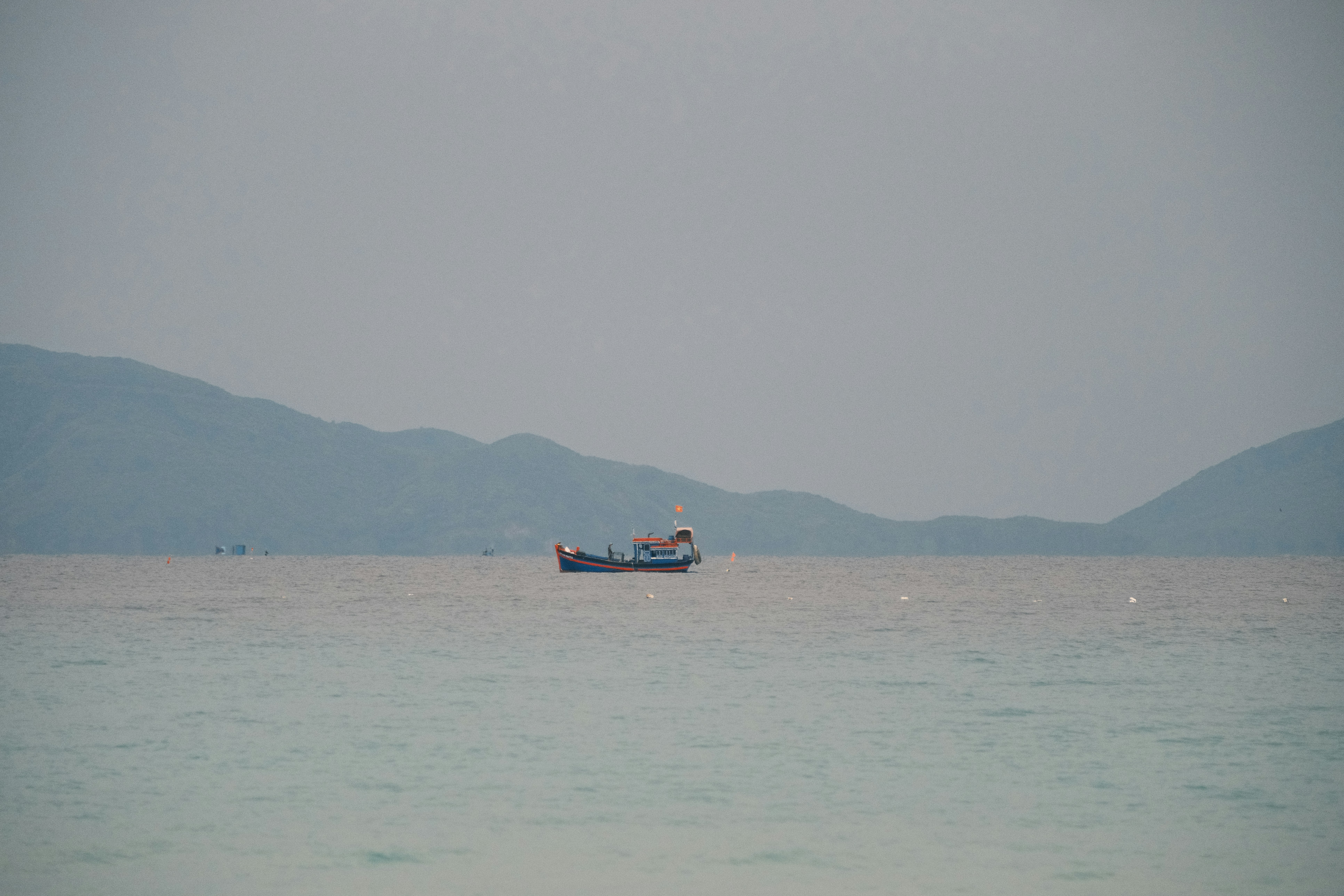 Solitary Vessel Amidst Tranquil Waters