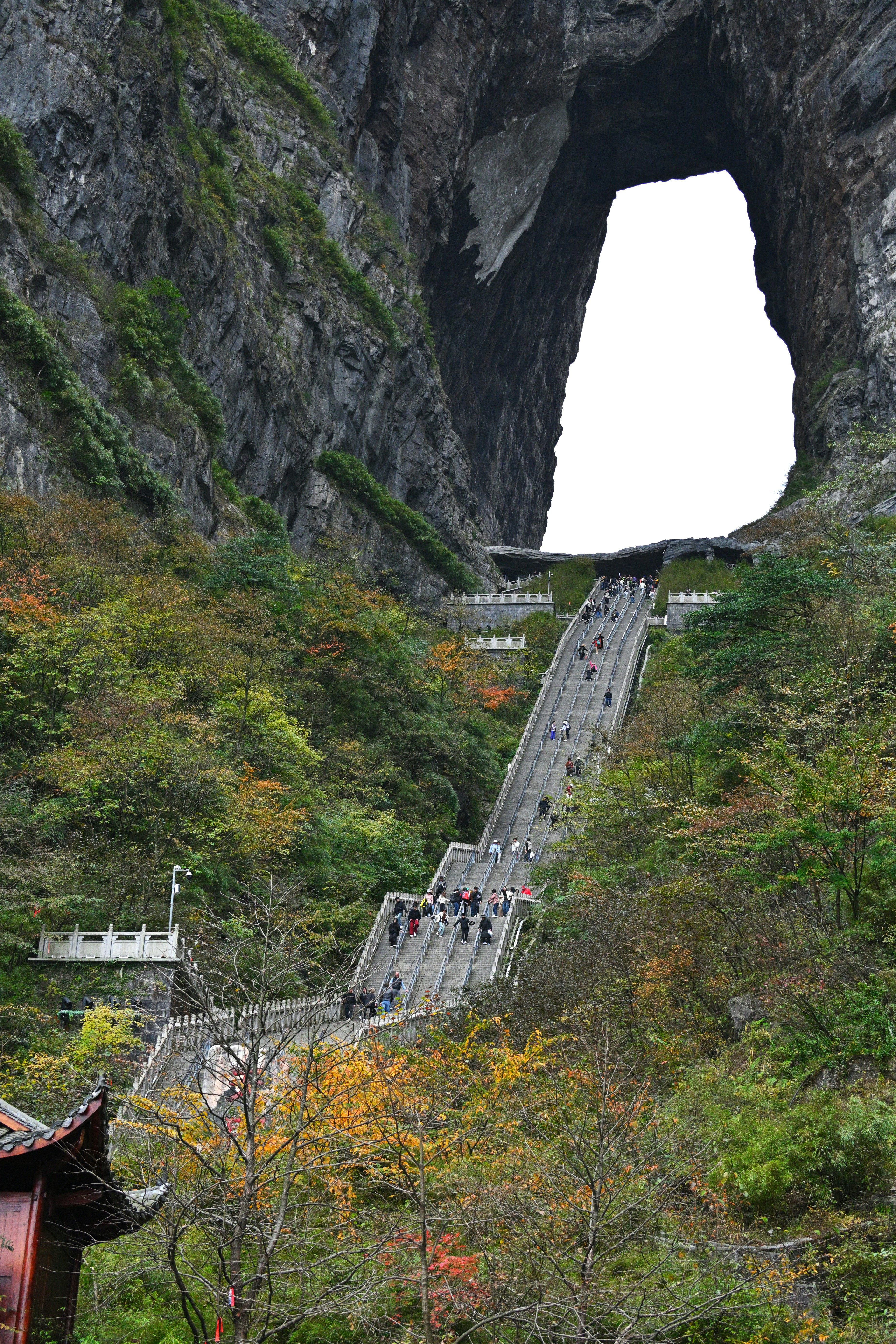 Gate to the Sky: Stepped Ascent Through a Mountain Arch