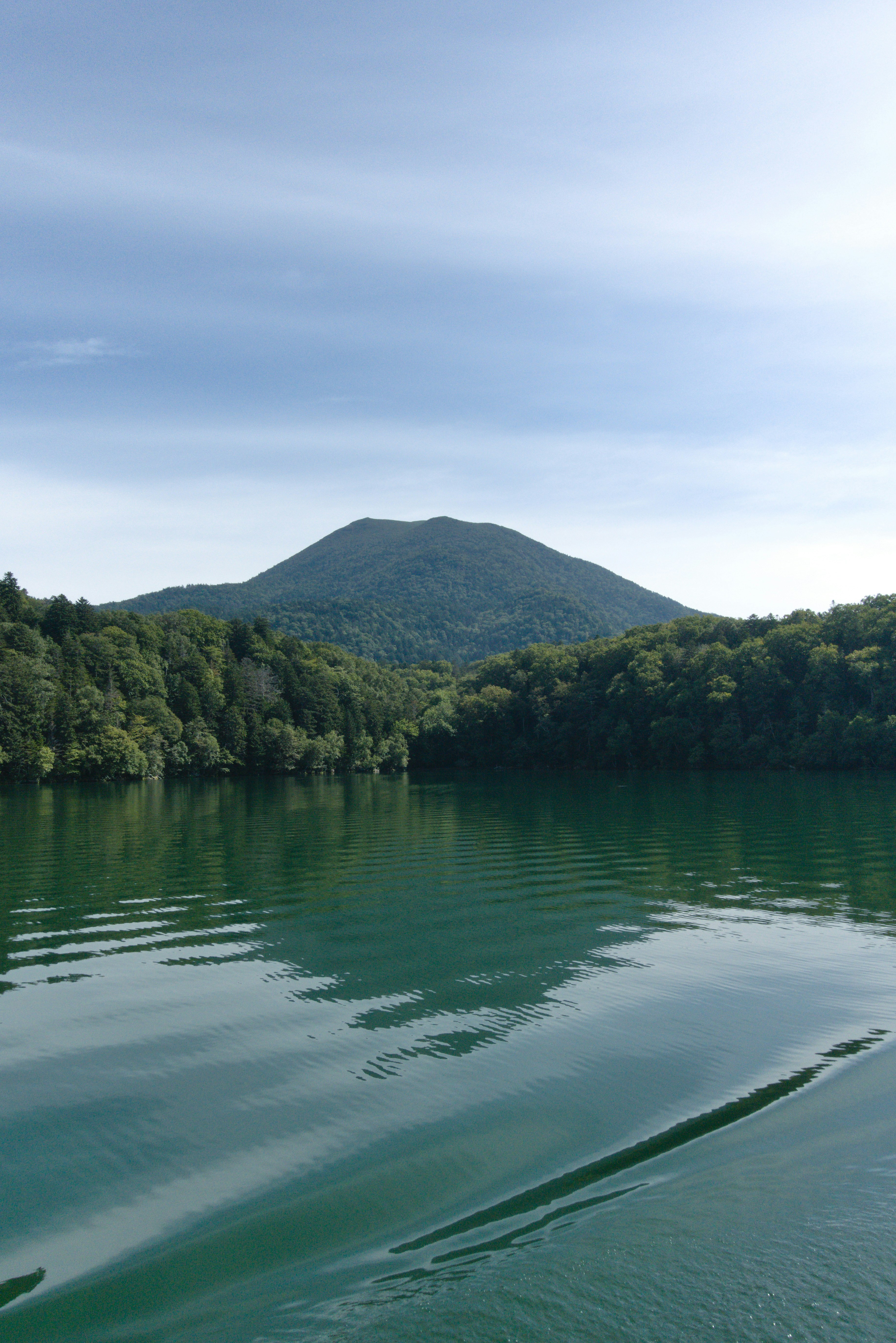 Reflections of Serenity: A Mountain's Embrace