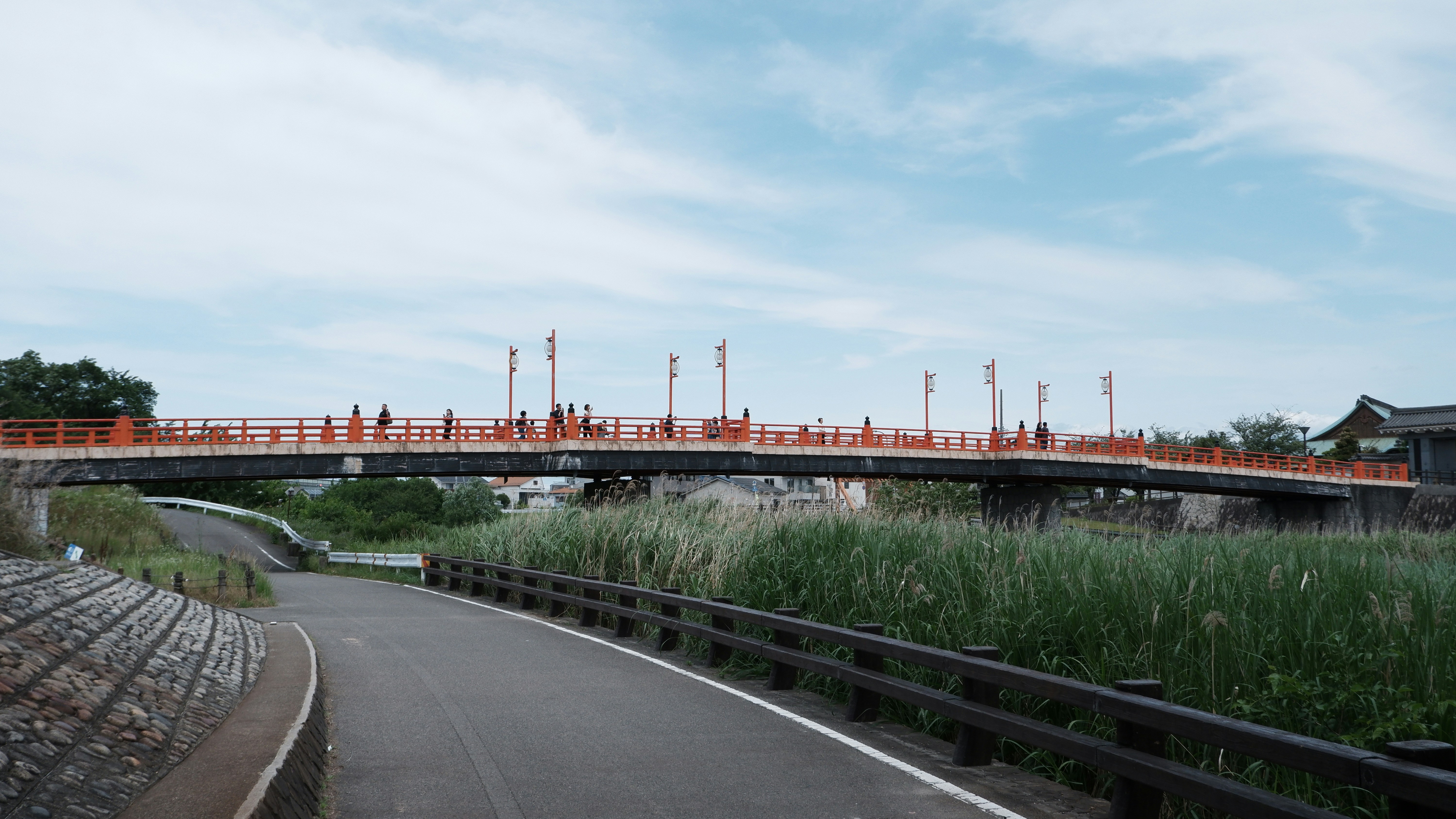 Vermilion Bridge Over a Quiet River