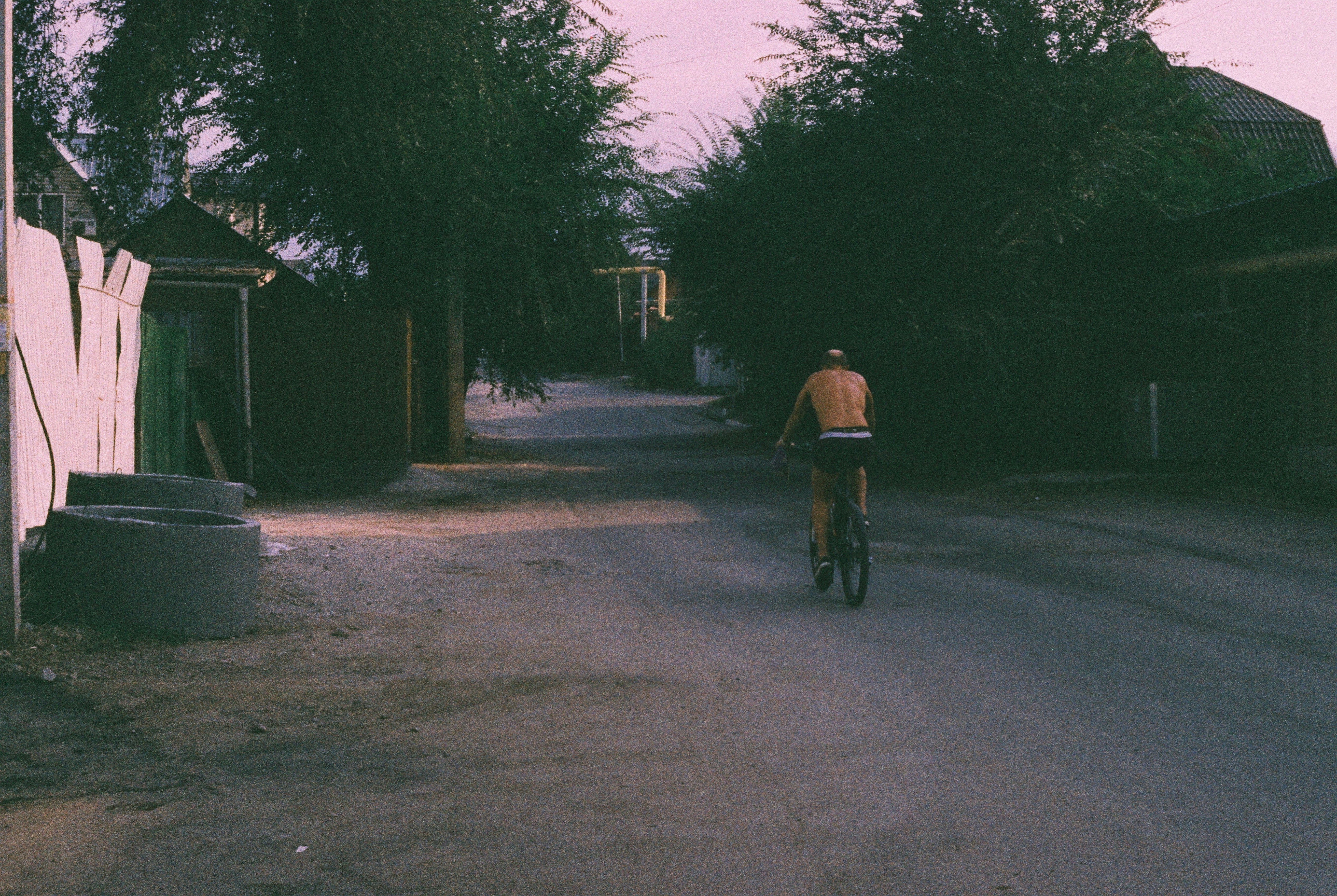 Person riding a bicycle down a street
