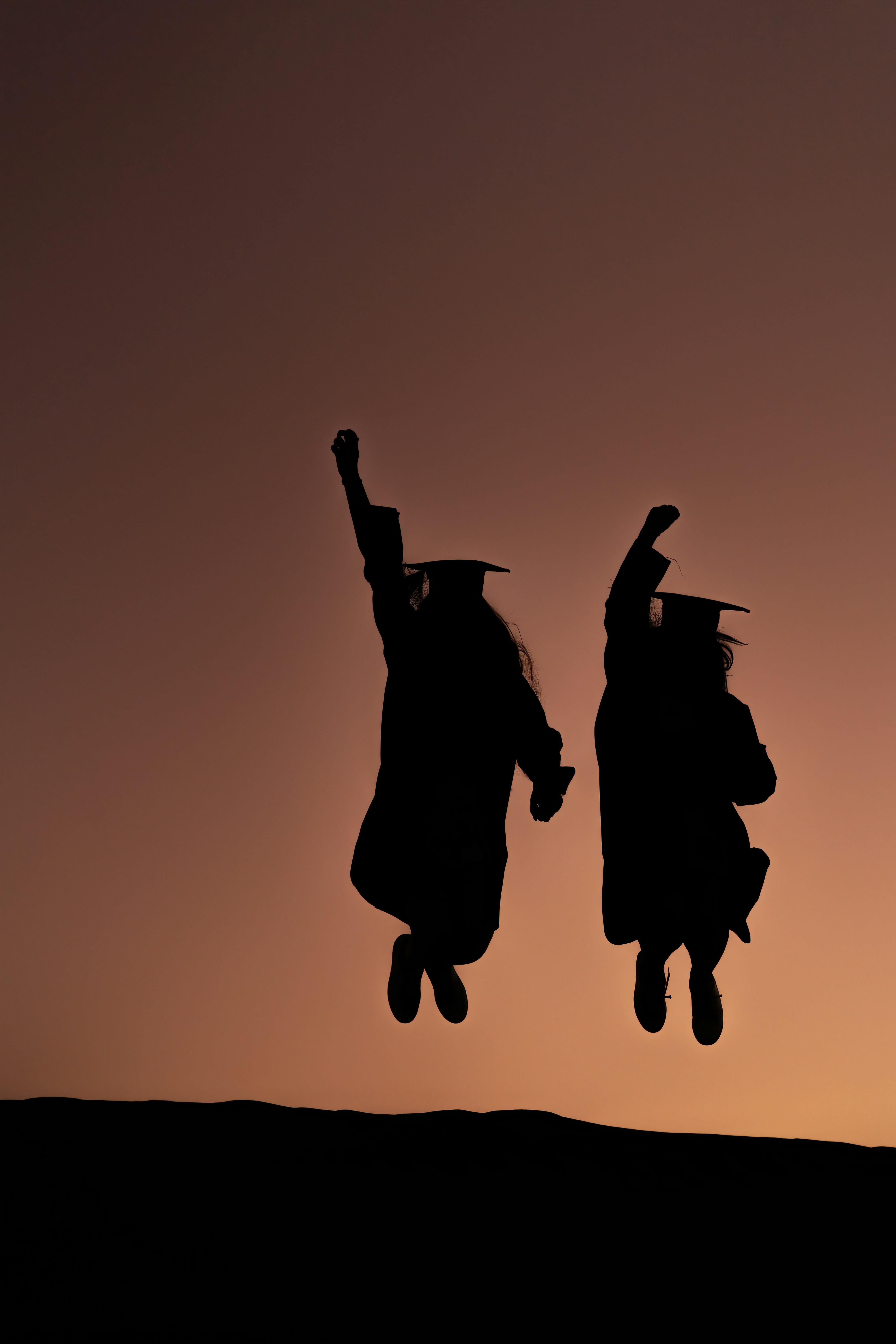 Euphoria at Dusk: A Graduation Leap