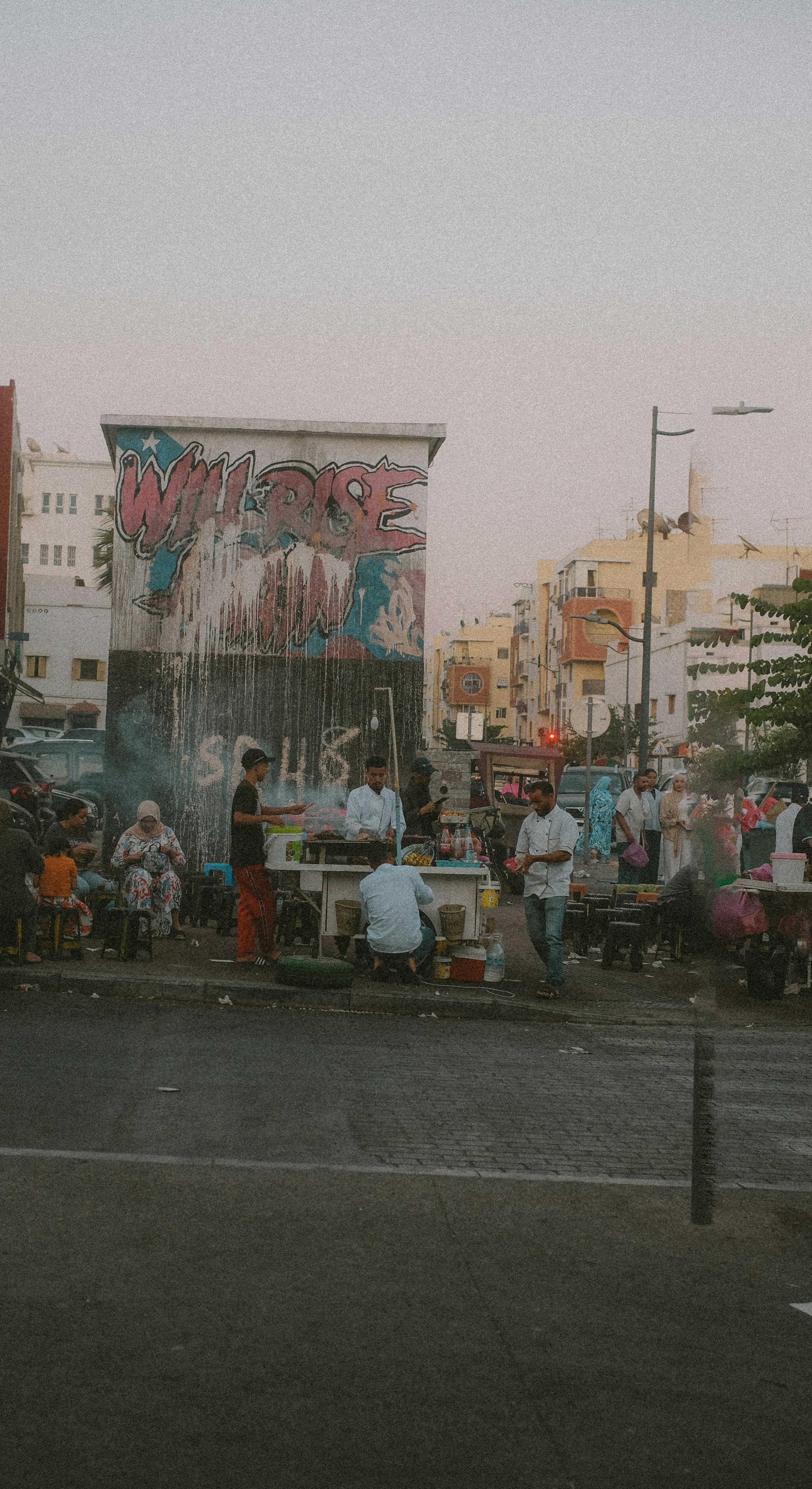 Urban Mosaic: Life and Art in Motion