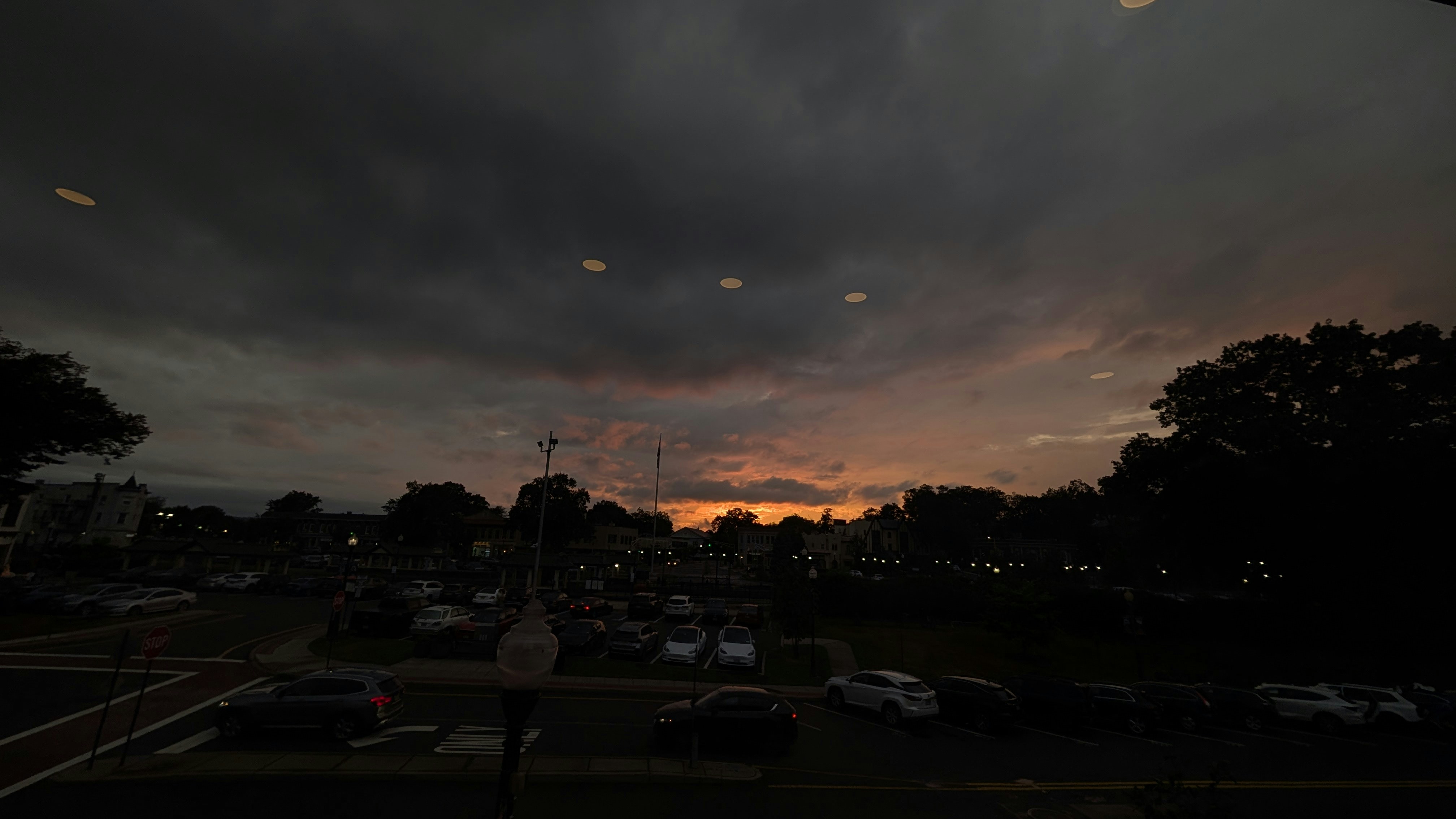 pleasant dreamy sunset | Dramatic sunset sky over a parking lot.