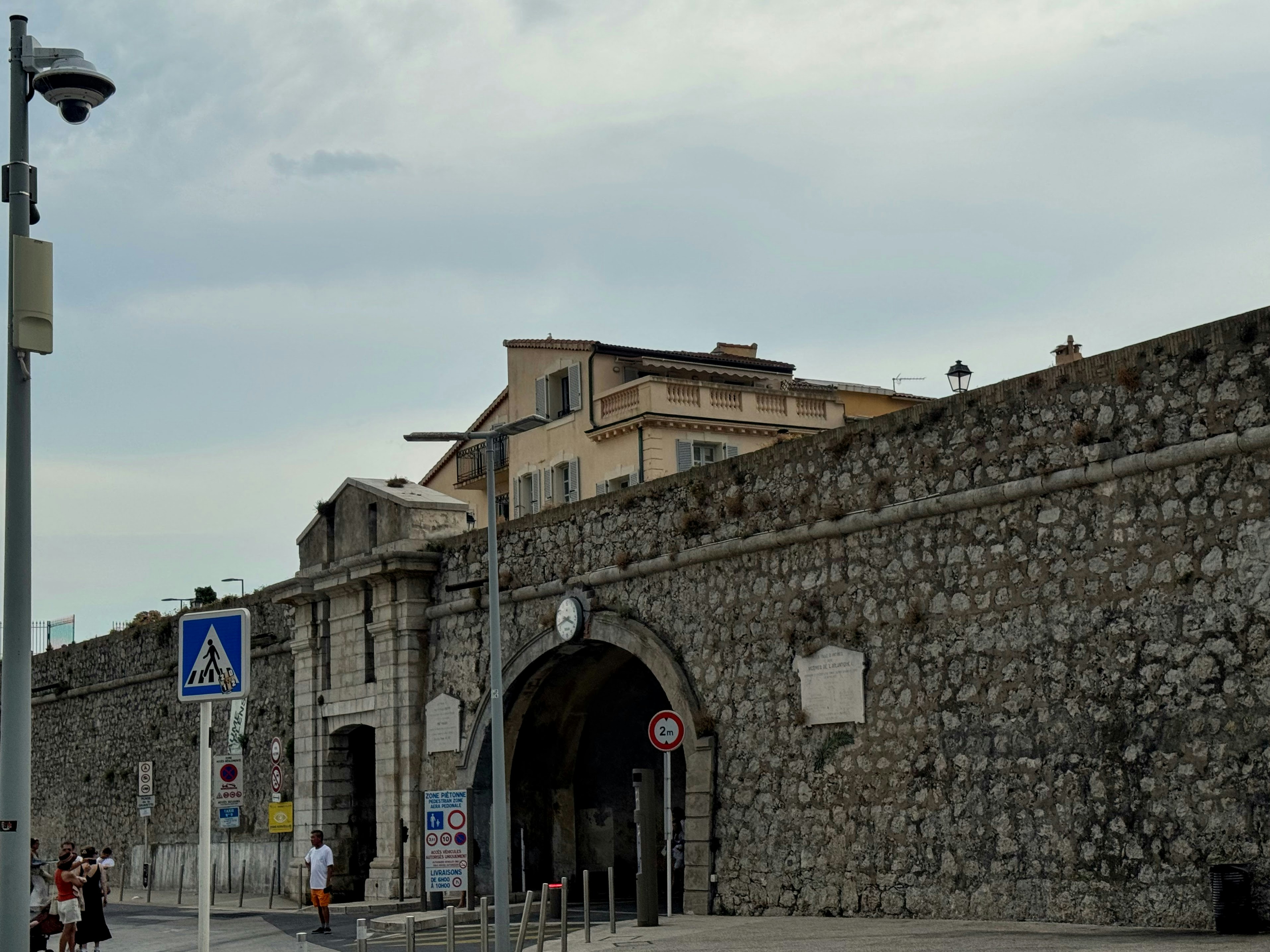 Stone archway entrance to old fortified city
