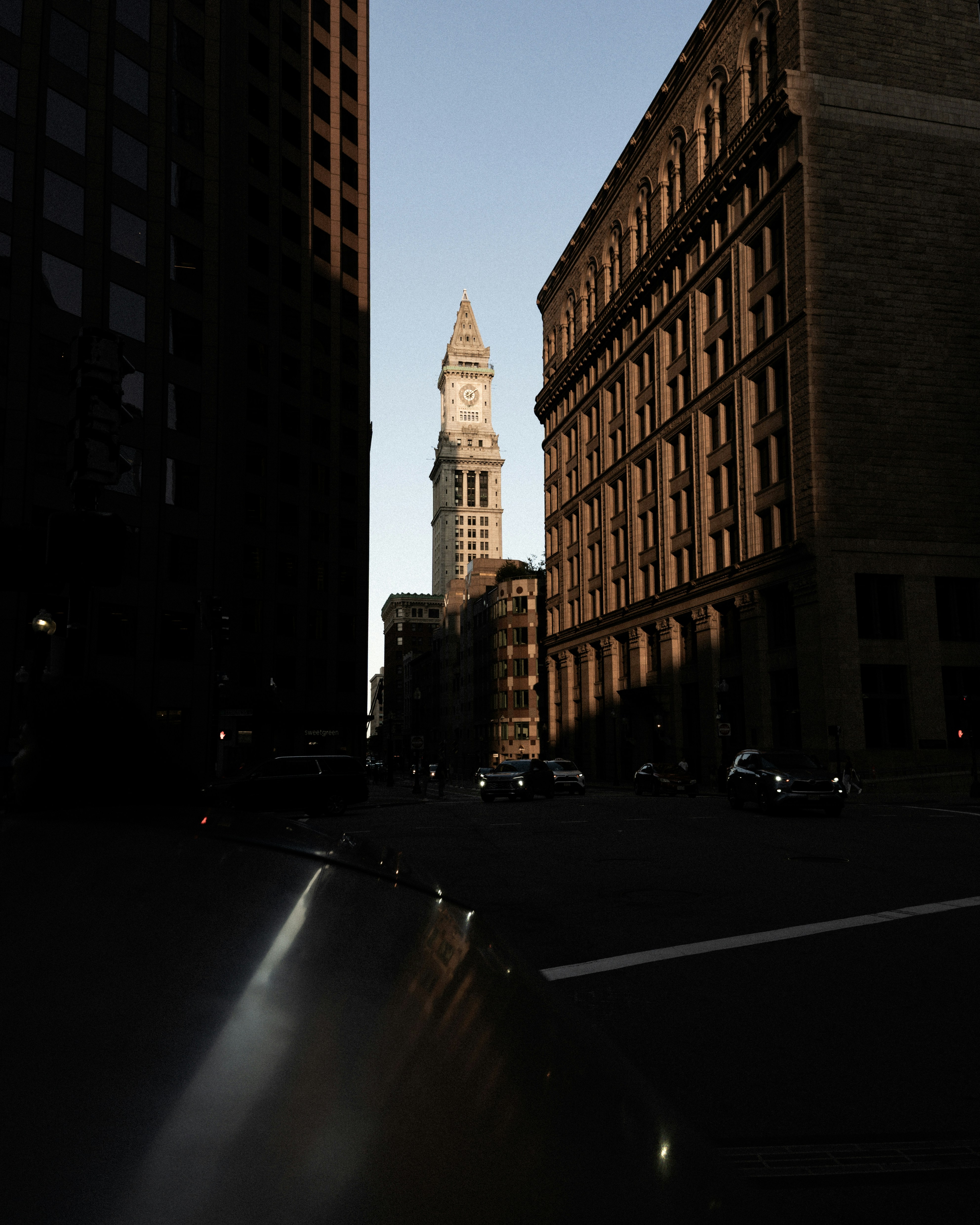Urban Clocktower Emergence at Dusk