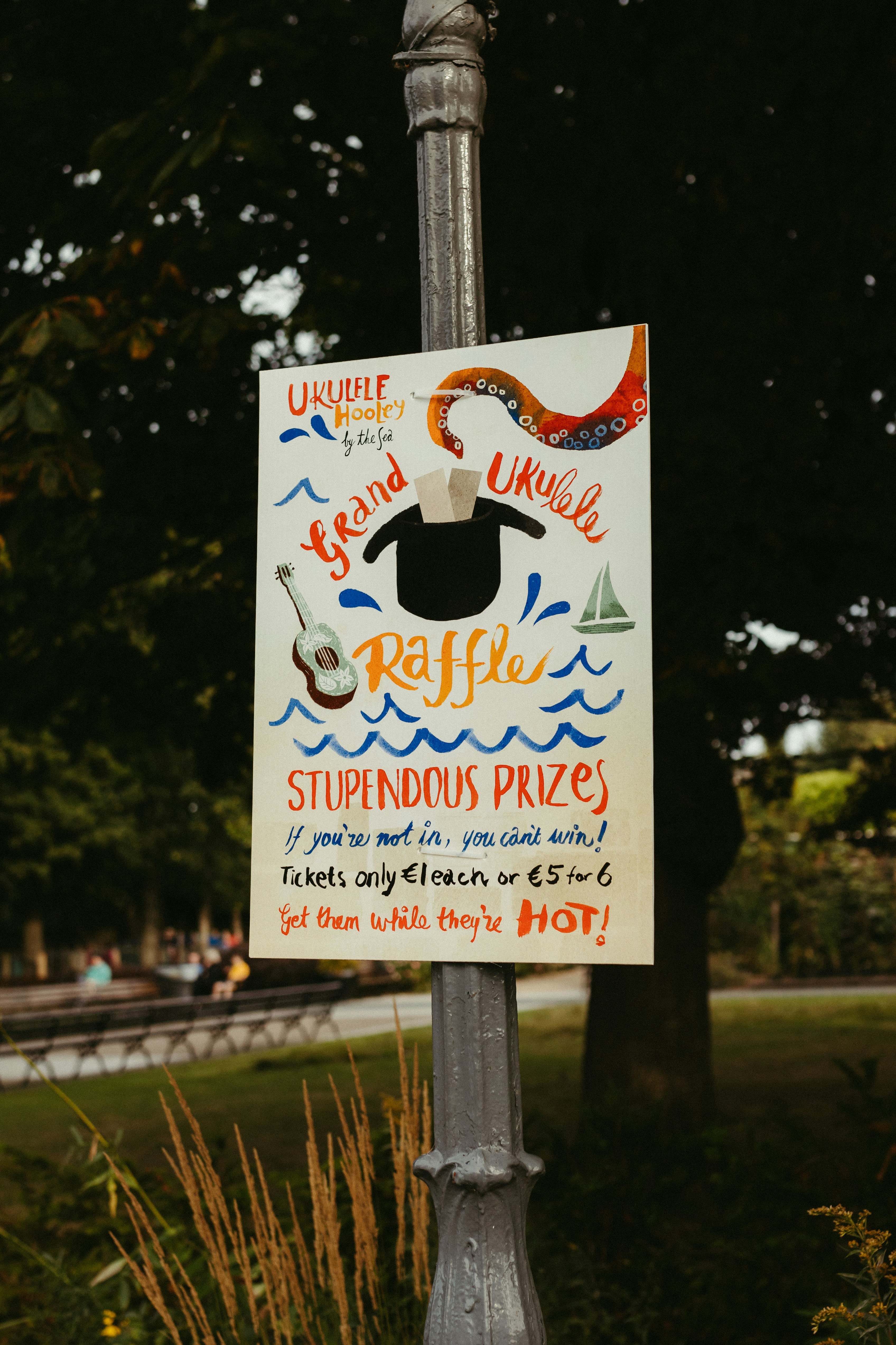 Parkside Ukulele Raffle Poster on a Weathered Lamp Post