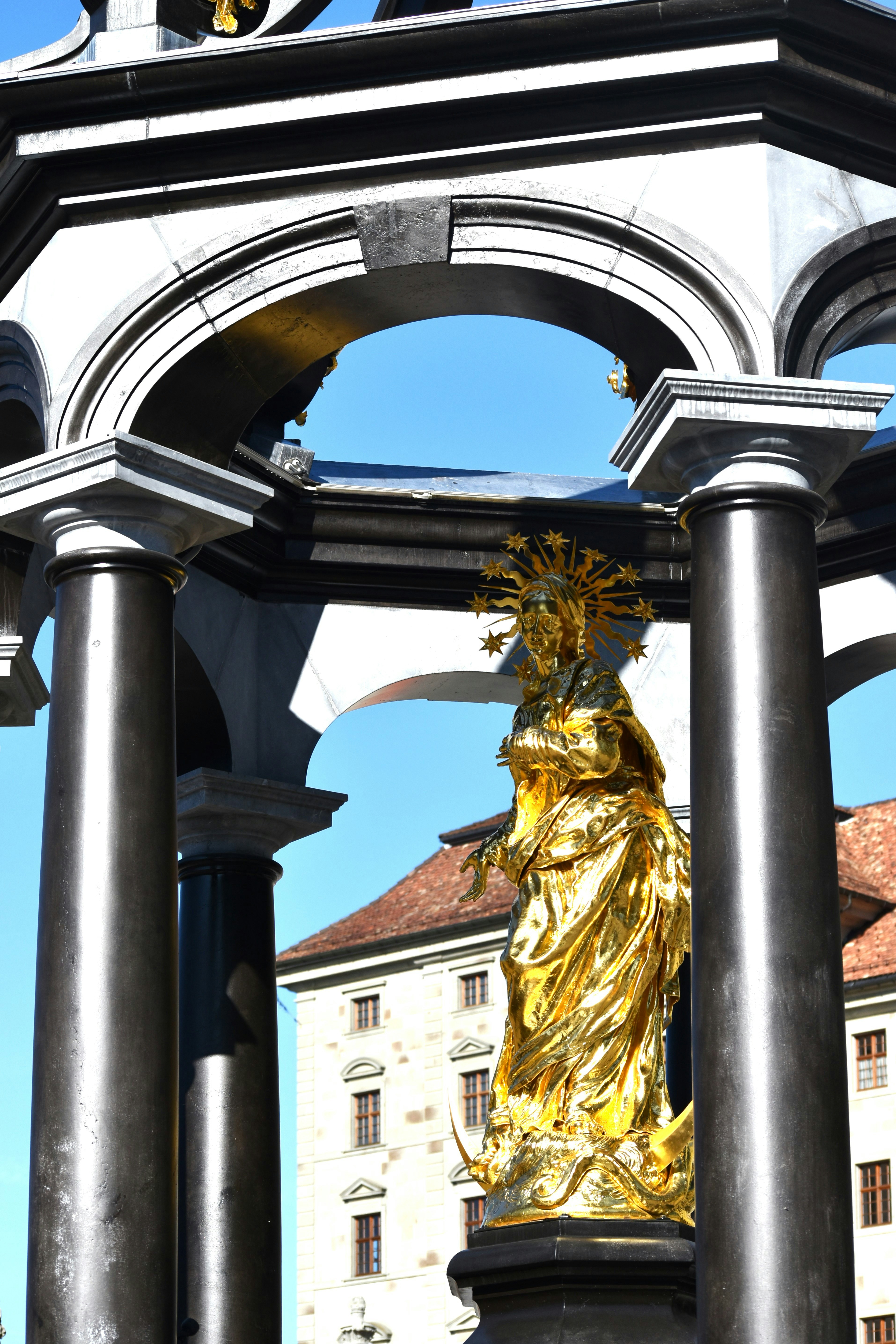 Golden Radiance Beneath Architectural Arches
