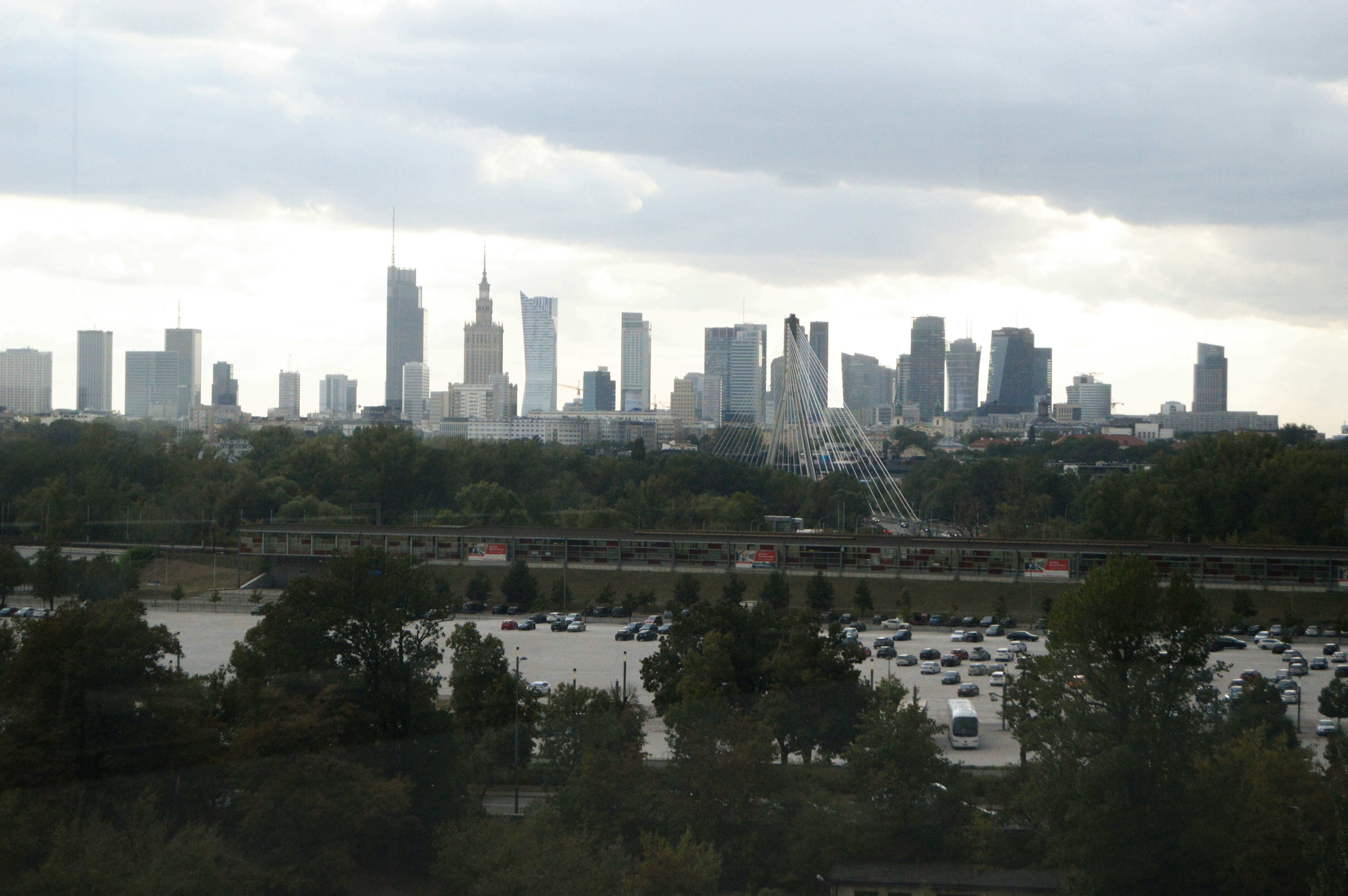 Urban Symphony: A Cityscape Under Cloudy Skies