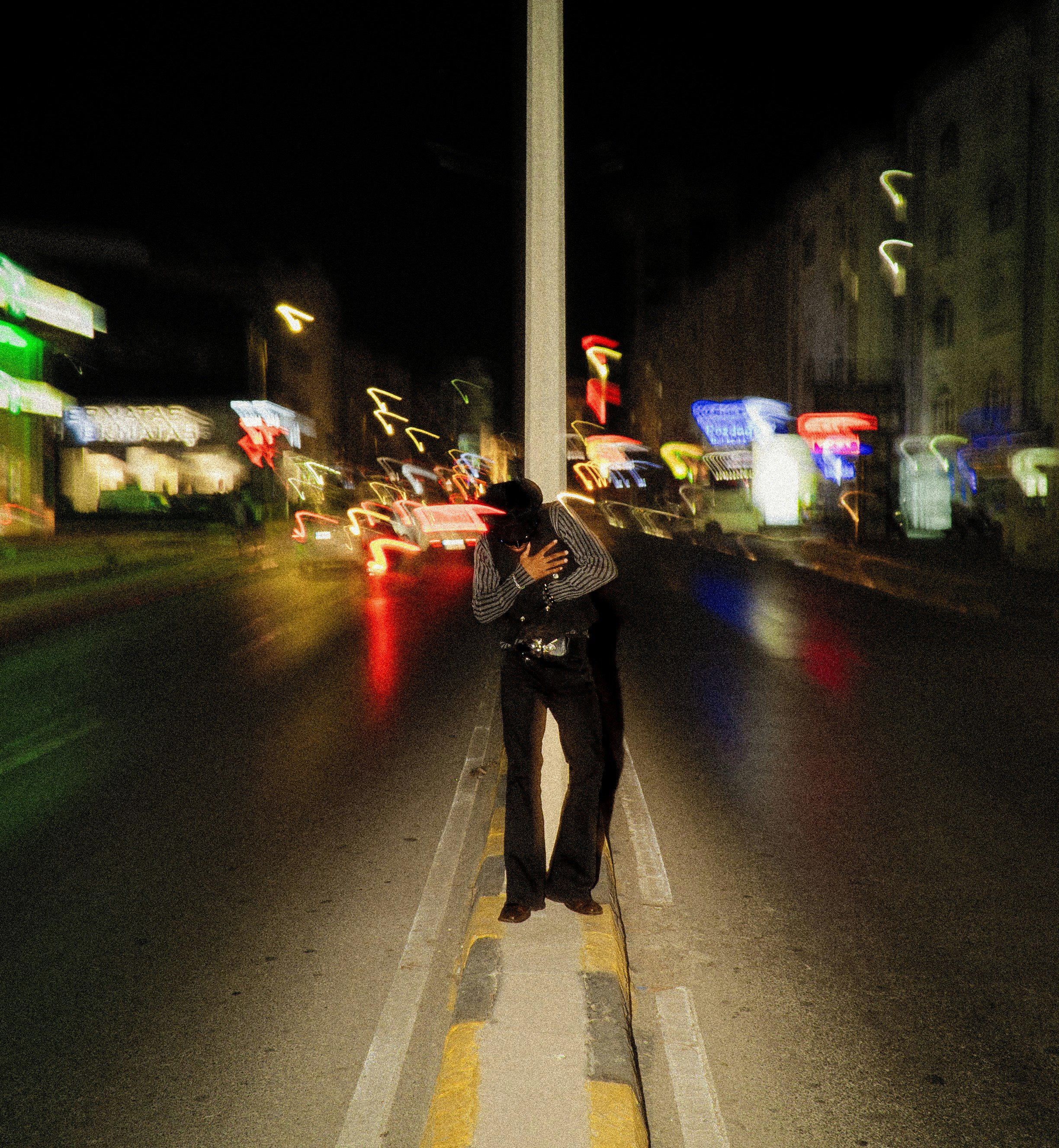 Urban Nightlife: A Moment of Solitude Amidst the Chaos