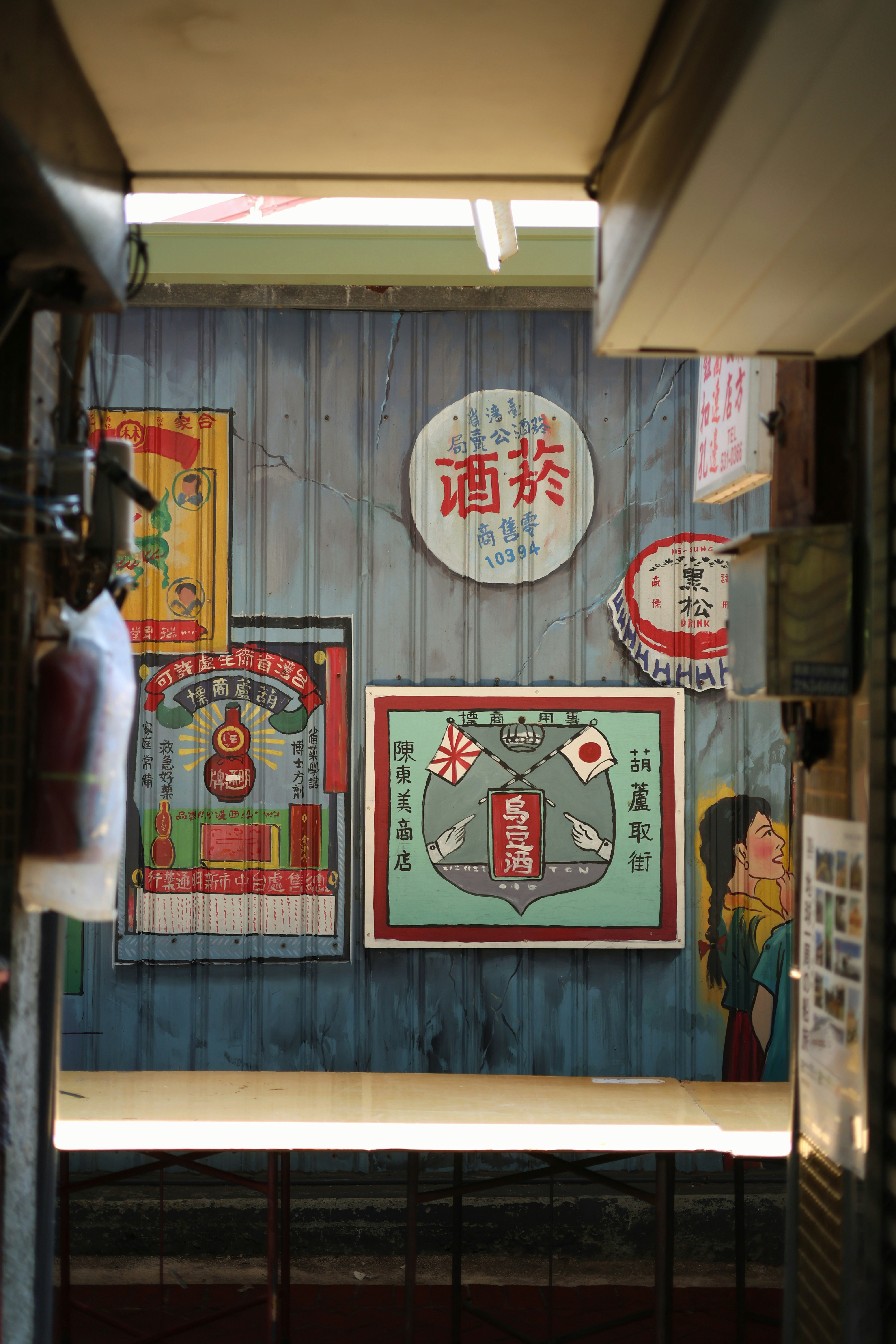 Echoes of Tradition: A Colorful Mural in an Urban Alley