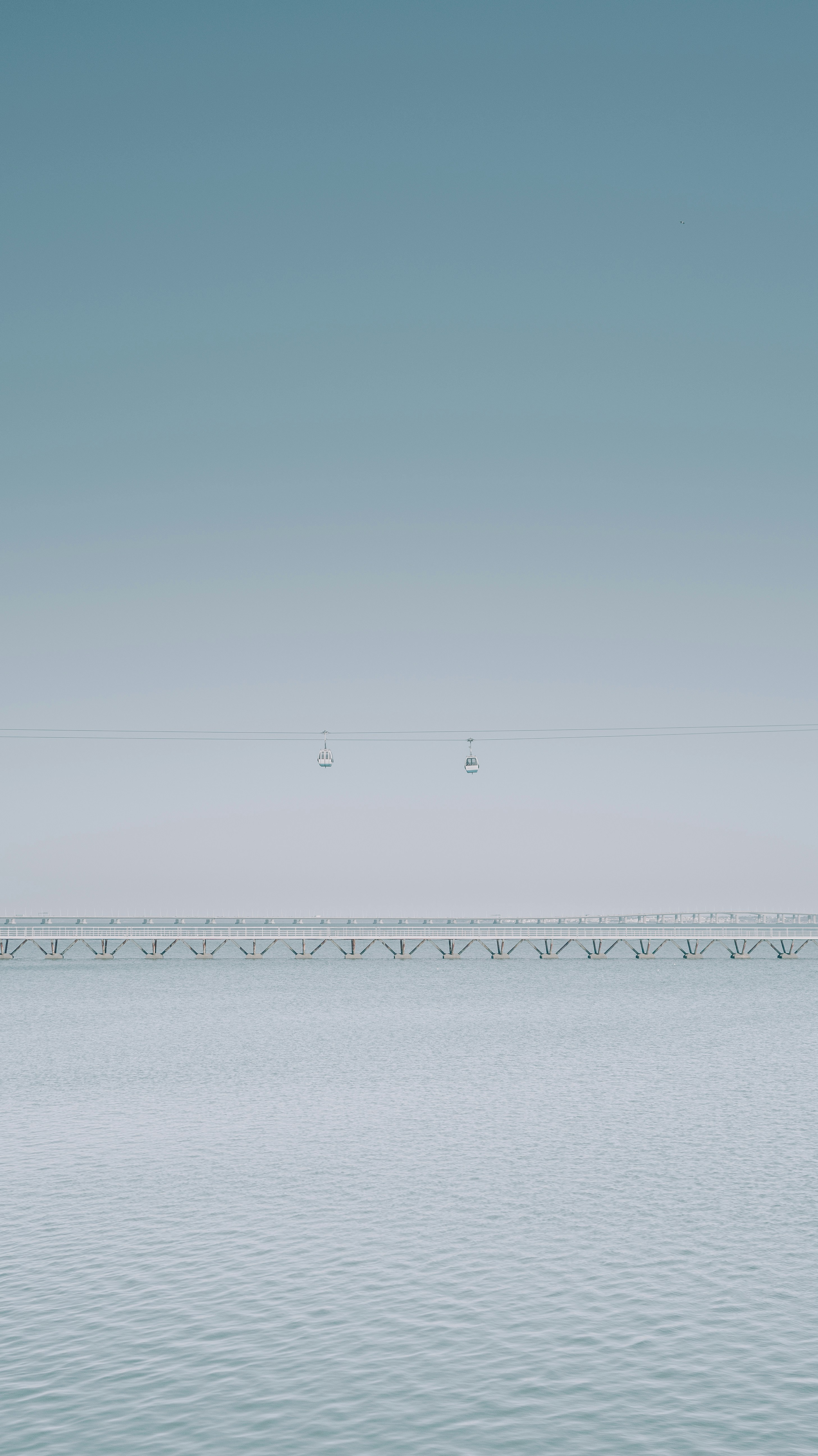 Suspended Serenity: A Journey Above Tranquil Waters