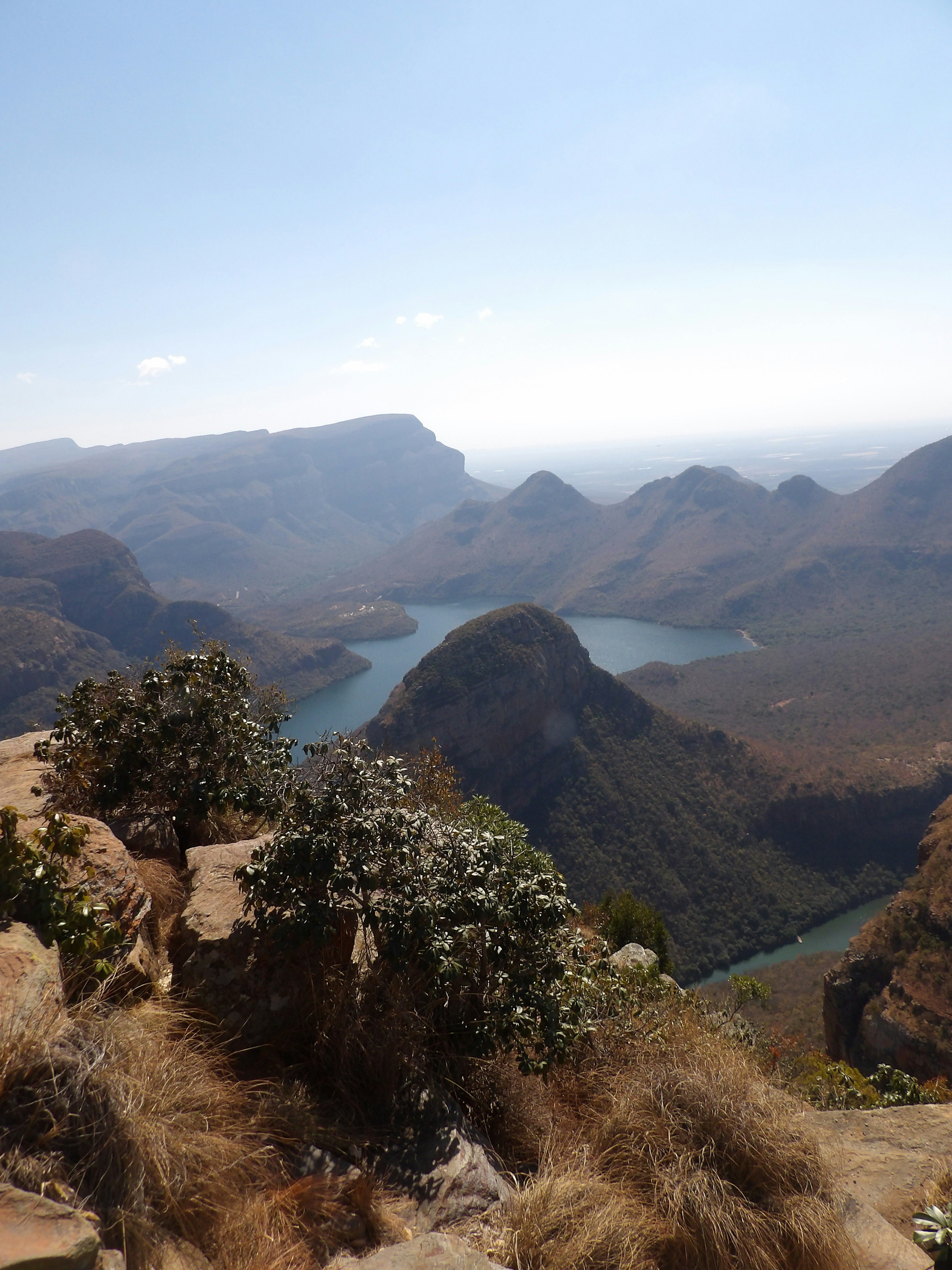 Scenic mountain landscape with a winding river below.