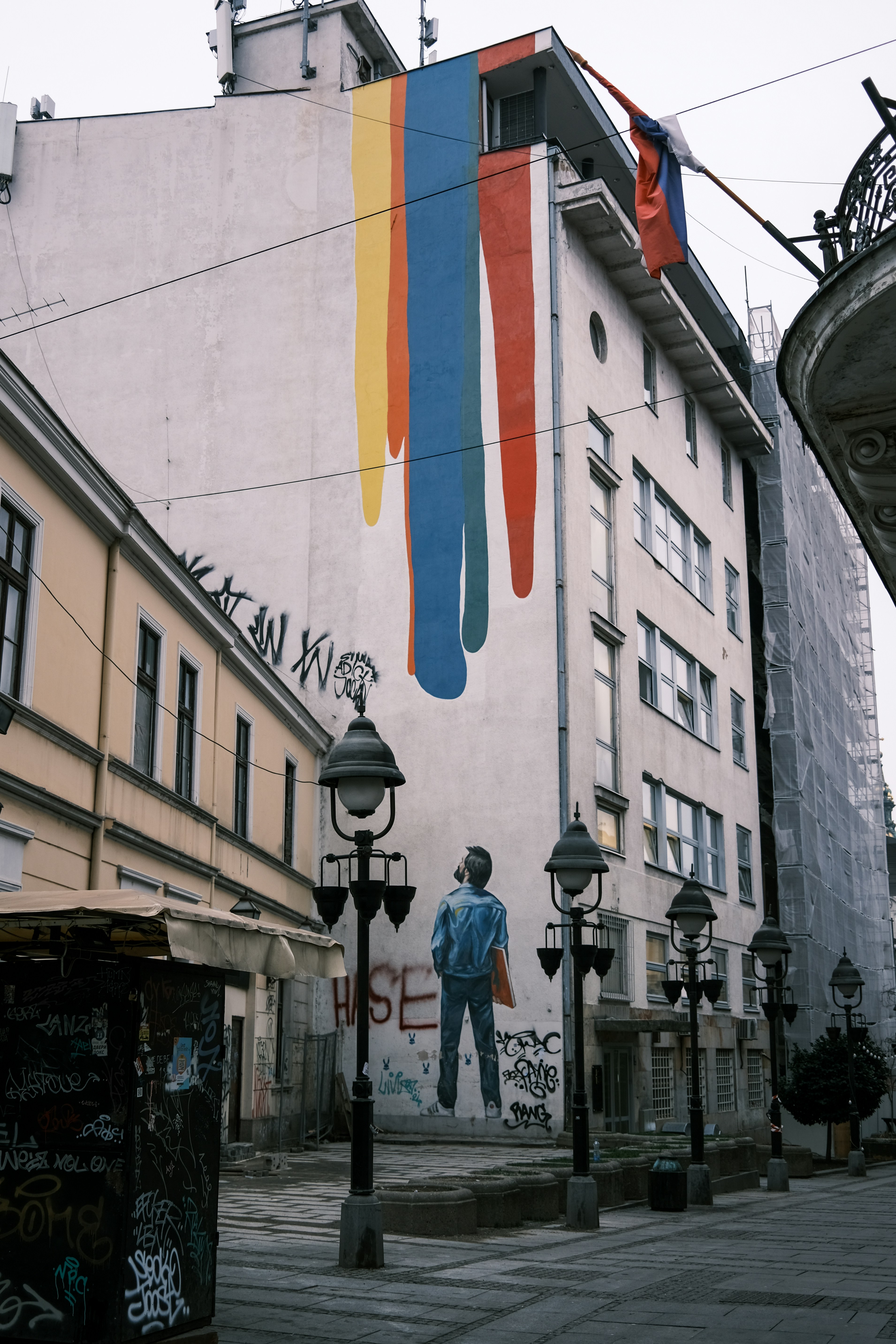 Belgrade art | Street art mural on a building with colorful drips