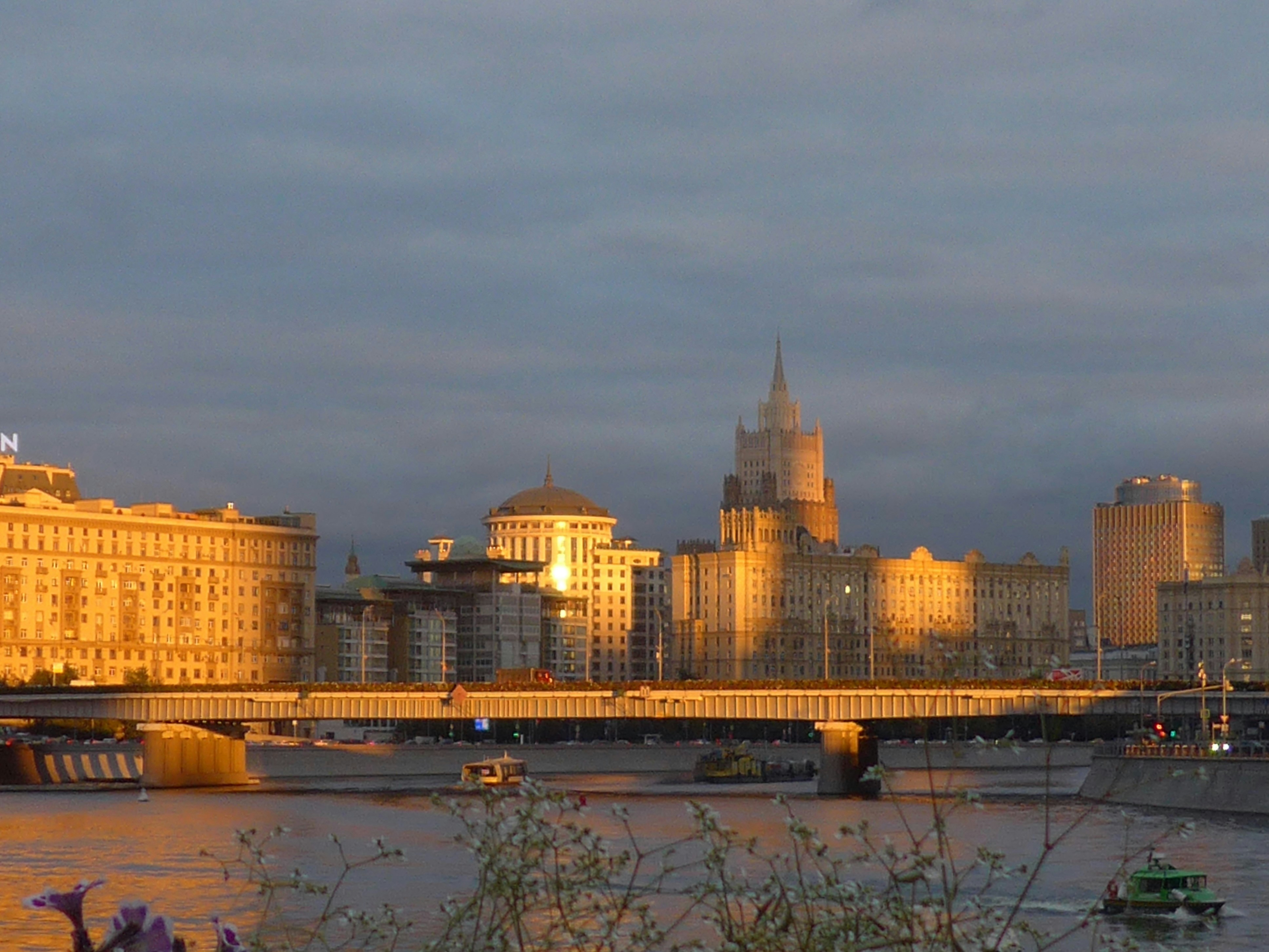 City skyline illuminated by golden sunset light
