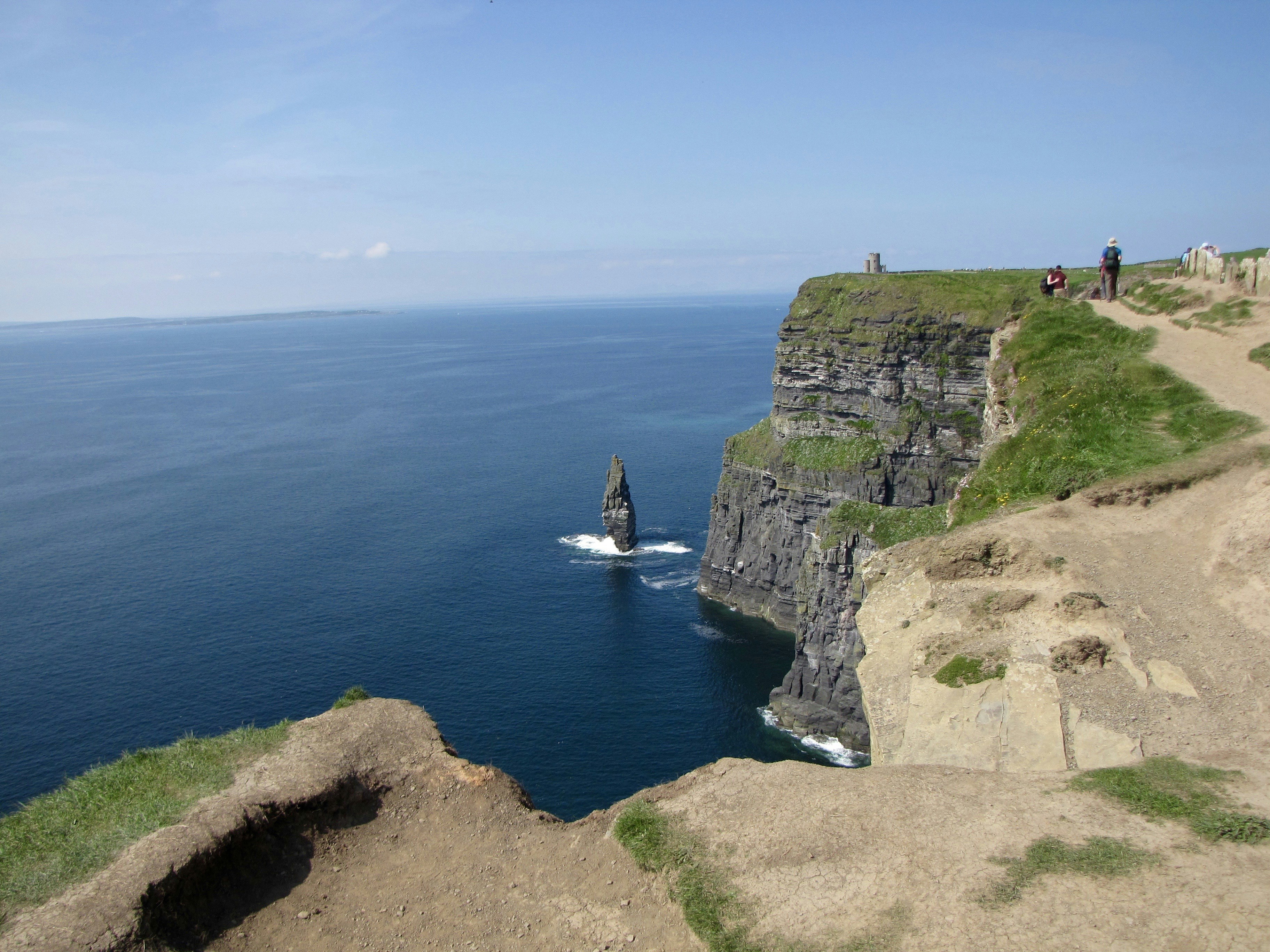 Cliffs of moher with a sea stack and blue ocean photo – Free Ireland ...