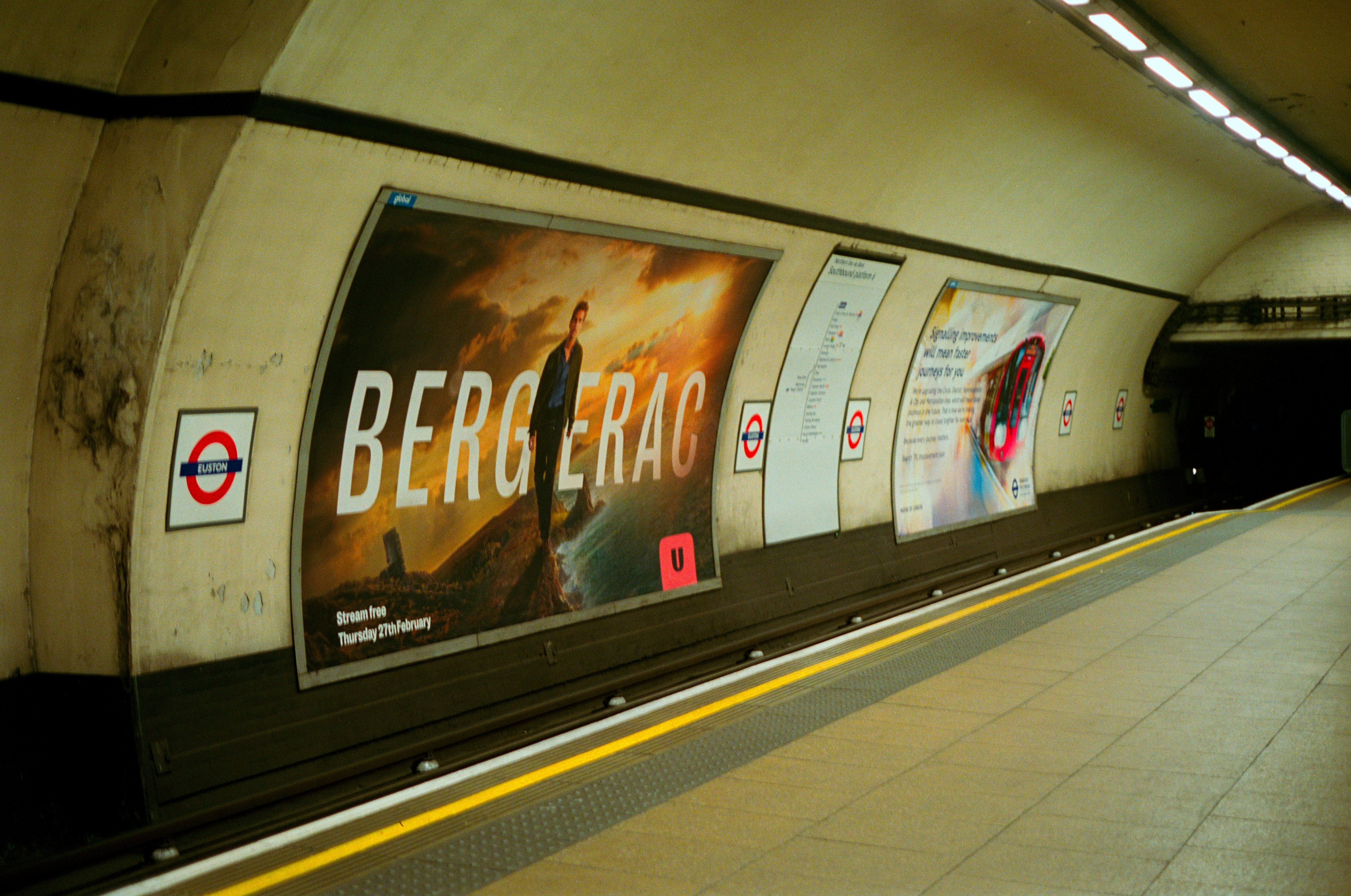 Underground Odyssey: A Peak at Berggrac Wall Advertisement