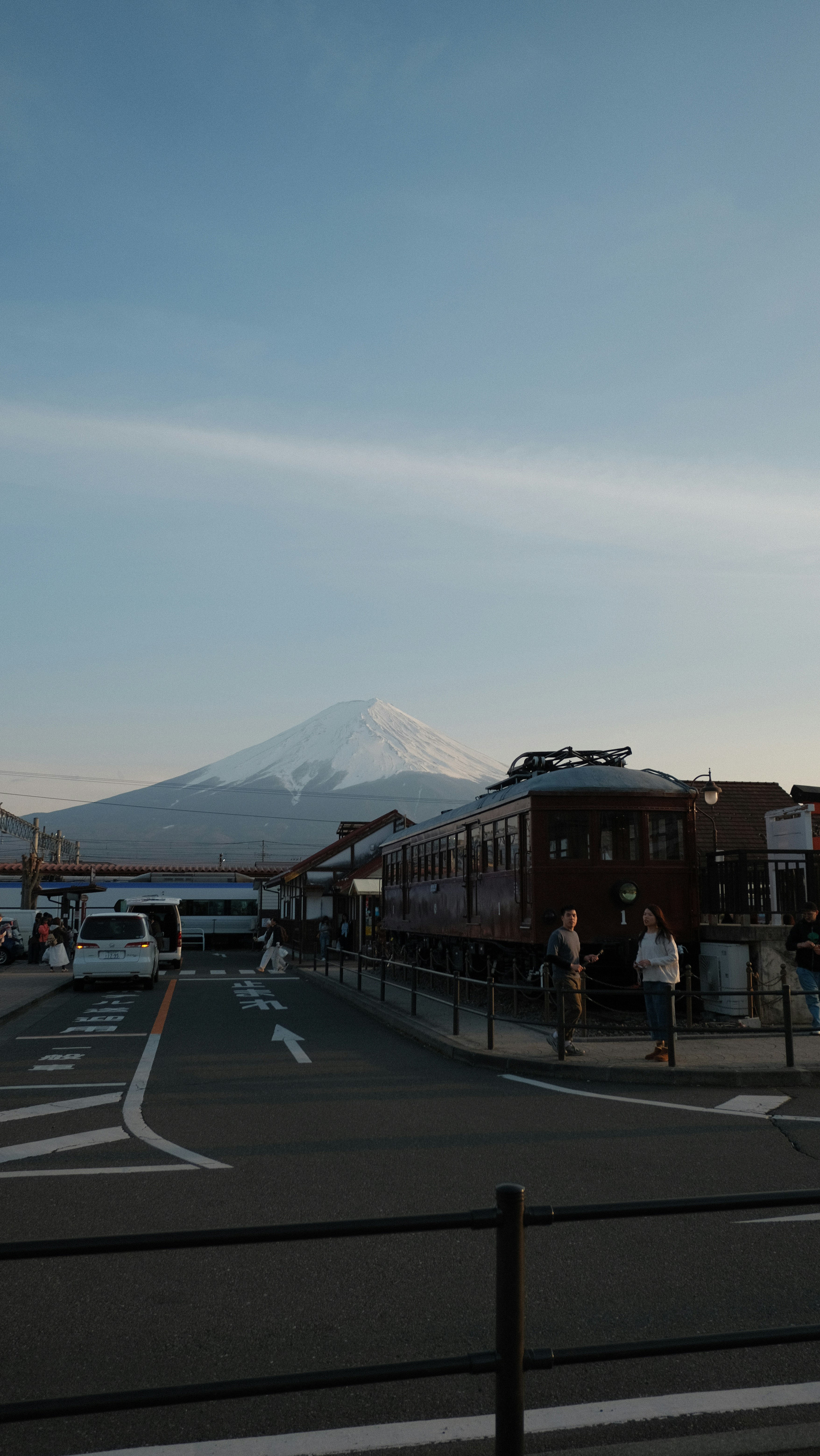 Mount fuji with a vintage train and people