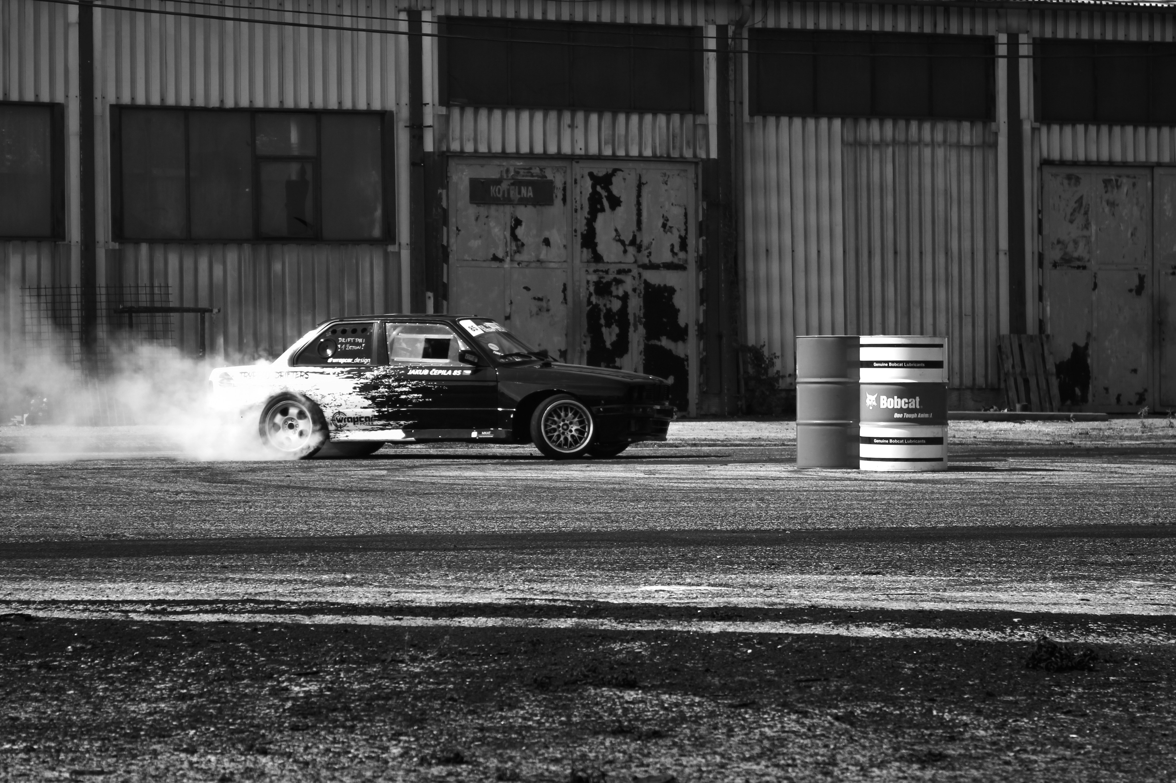 Little break from work? buymeacoffee.com/davidlembas | Drifting car creating smoke next to barrels