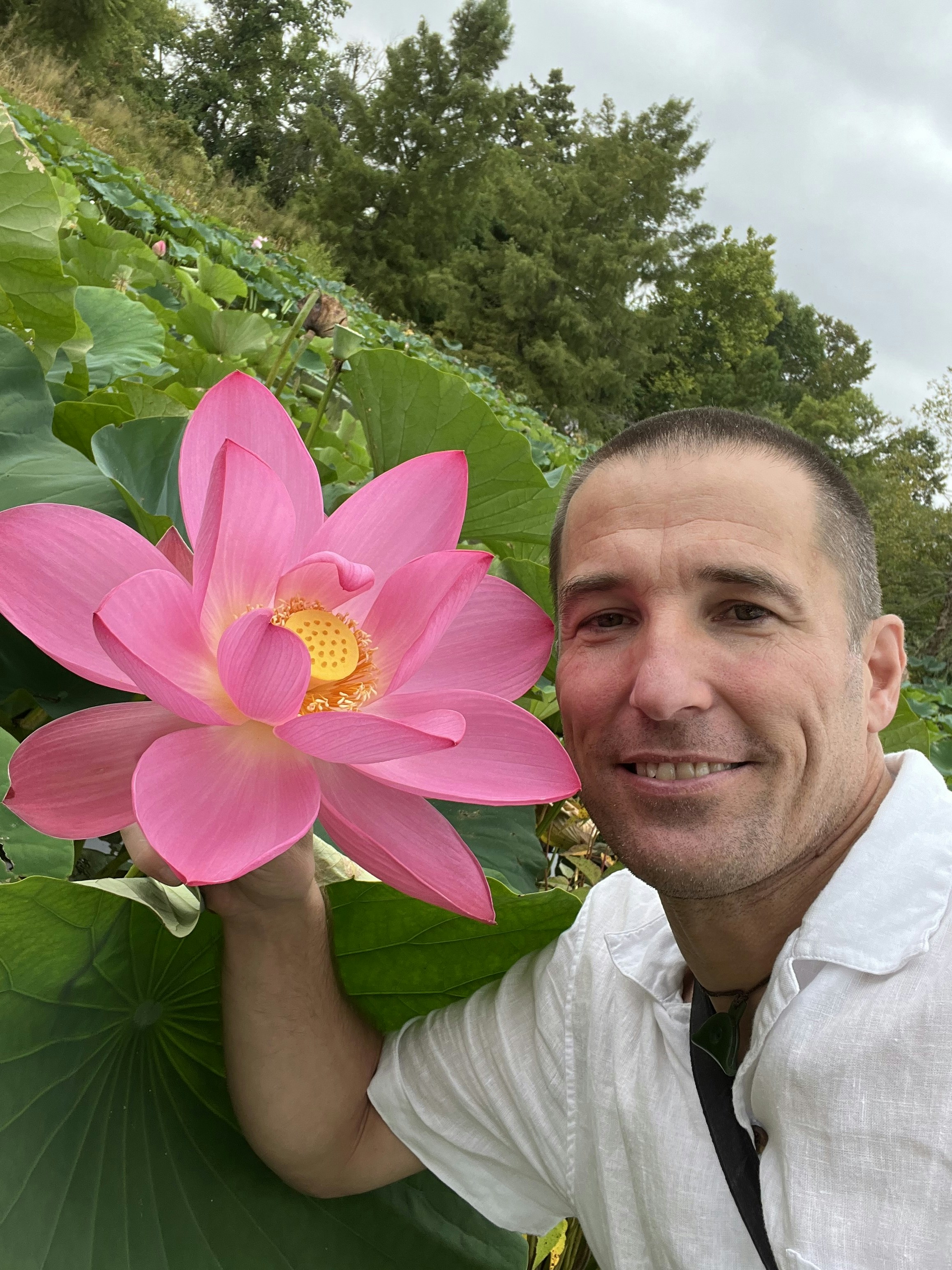Lotus and Laughter: A Bloom-Side Selfie