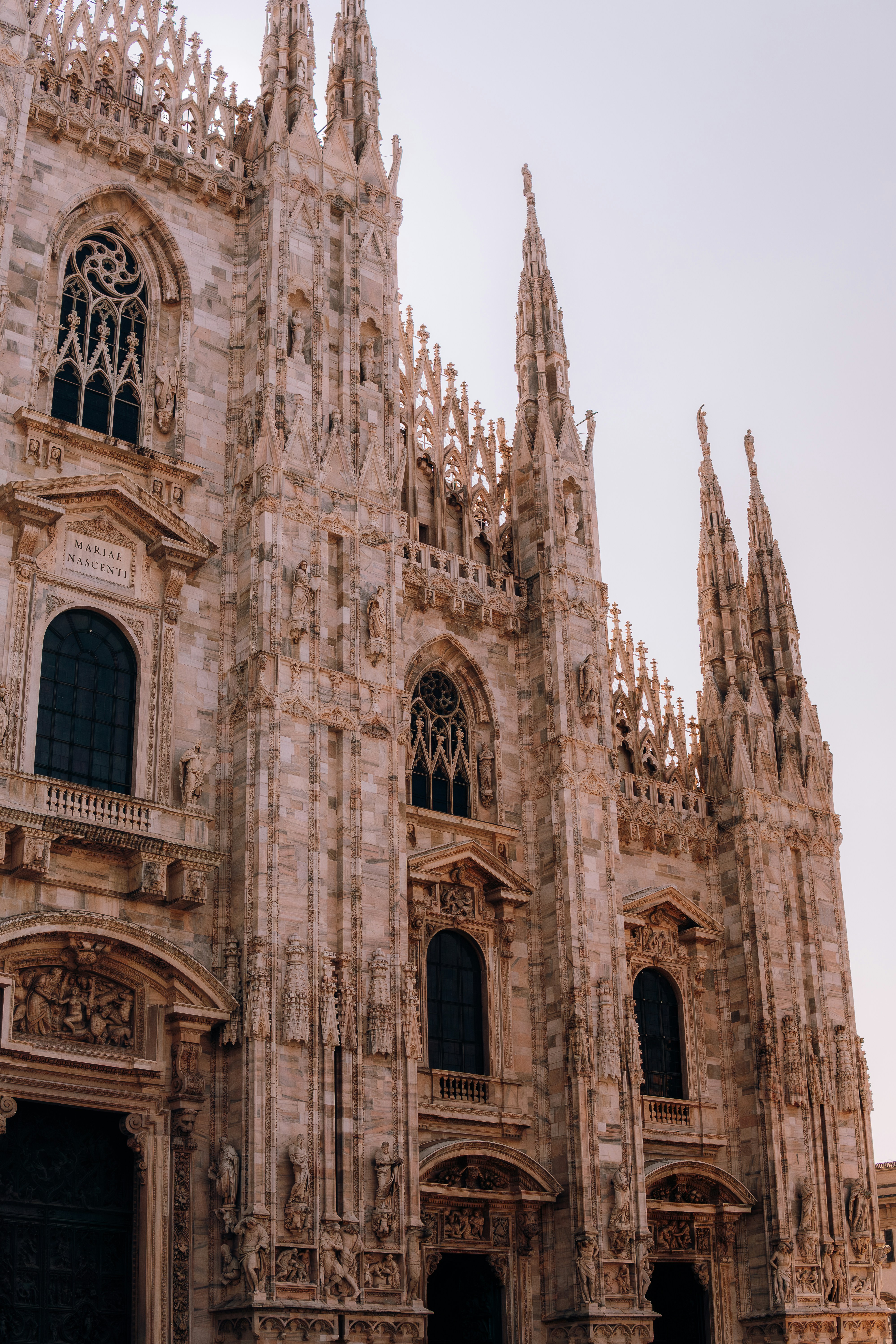 Ornate gothic cathedral facade with spires and windows