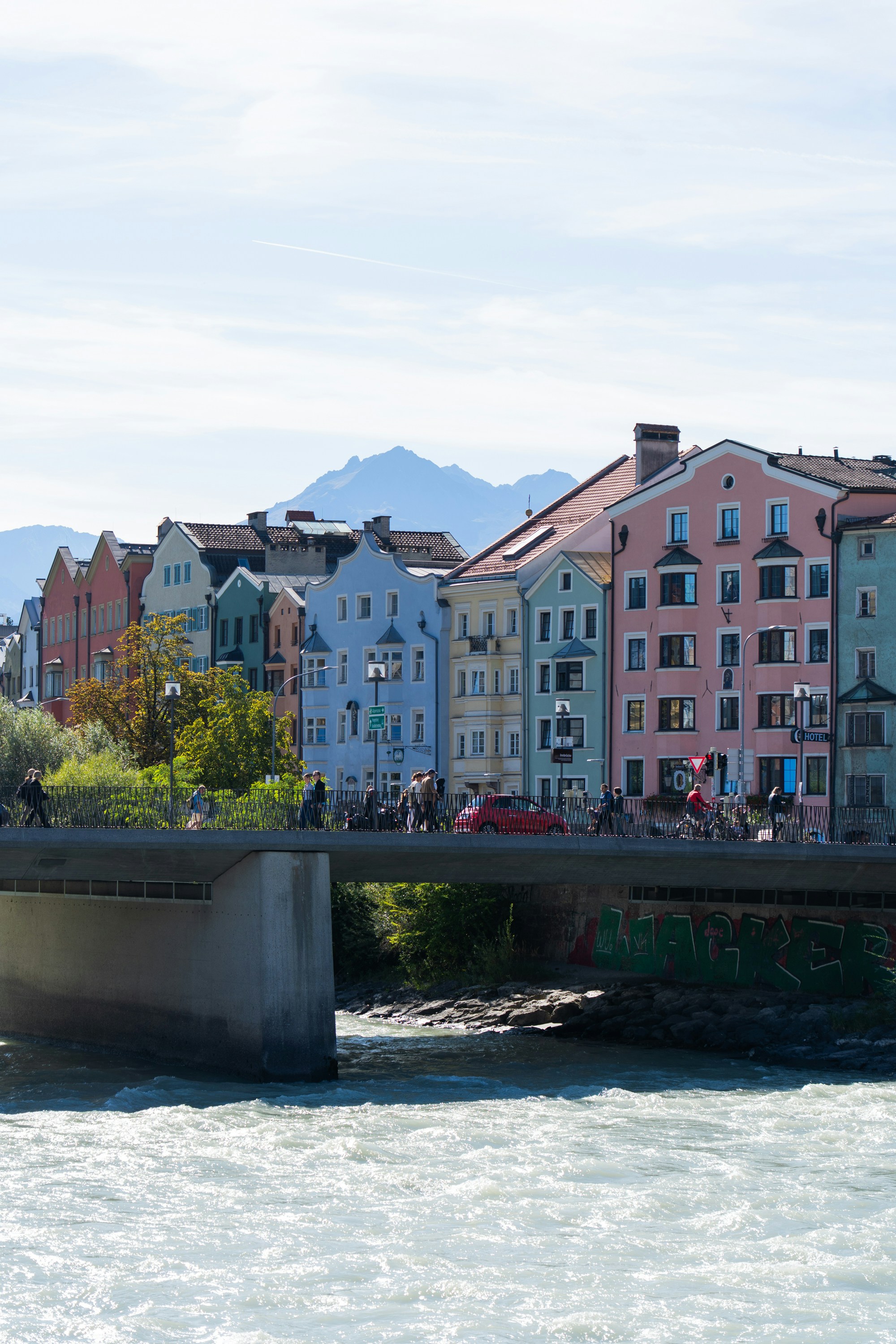Pastel Riverside Row Under Alpine Light