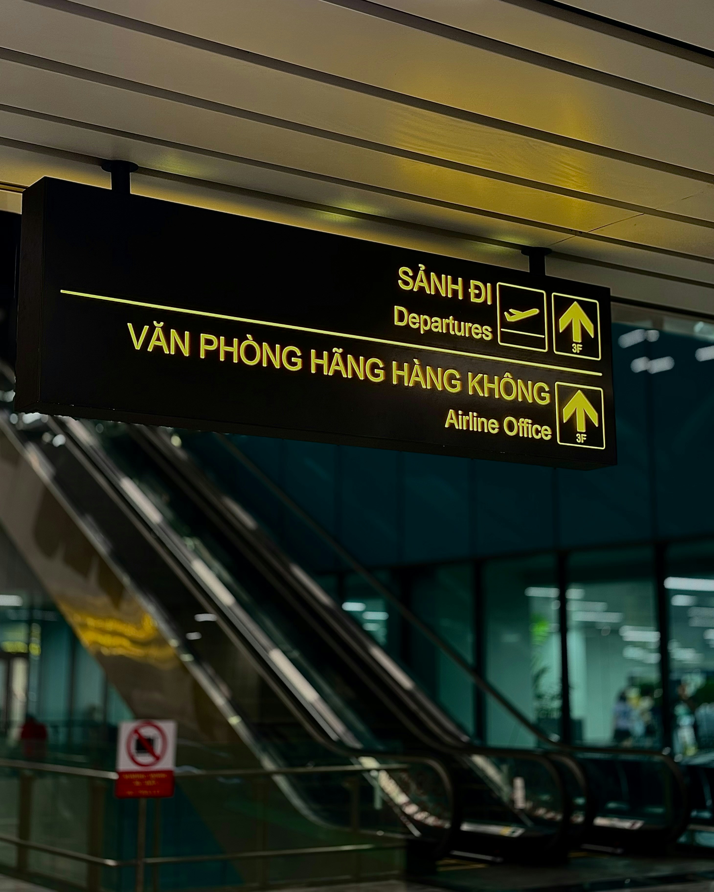 Airport signs for departures and airline office