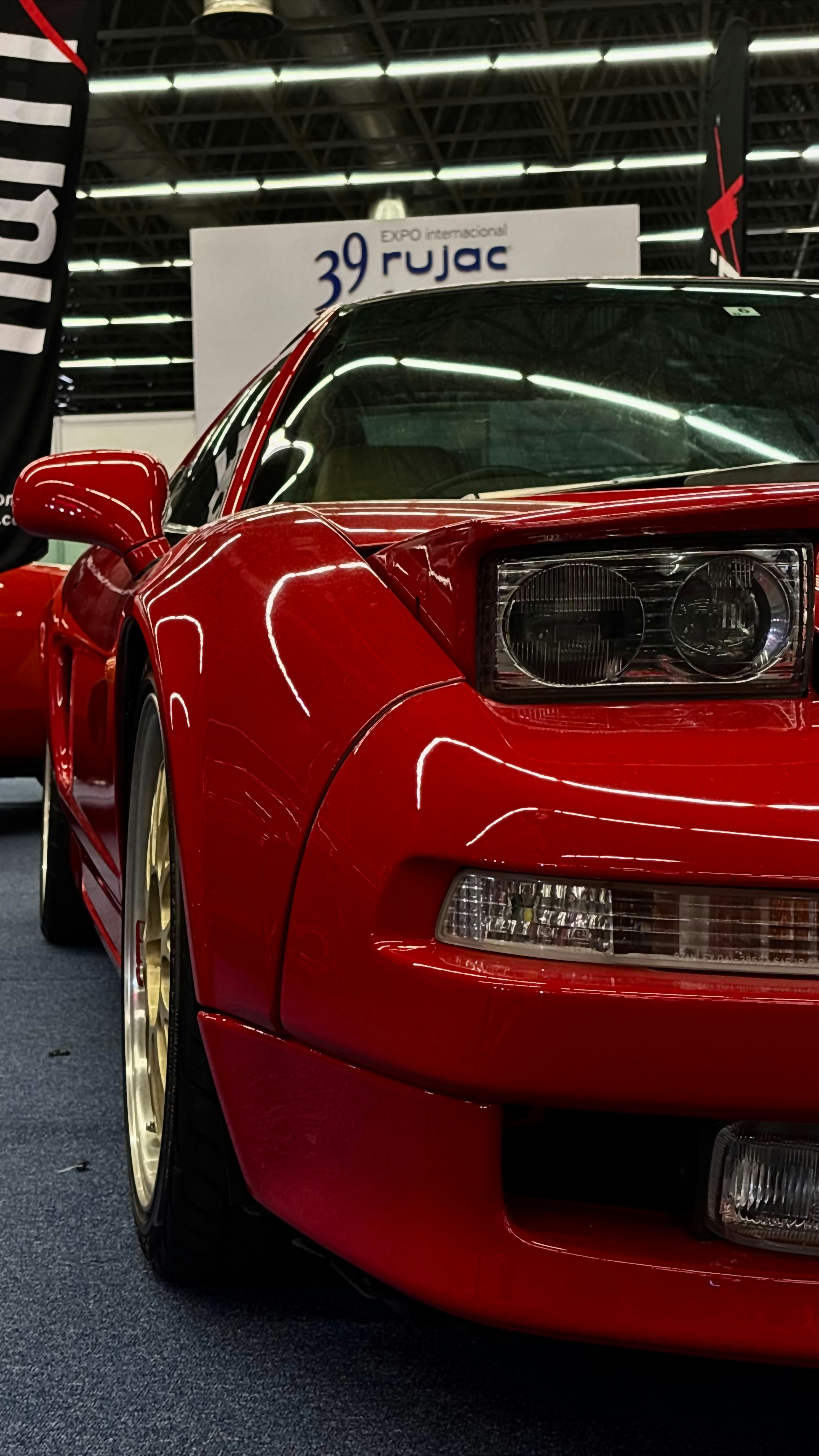 Crimson Front Quarter Under Expo Lights