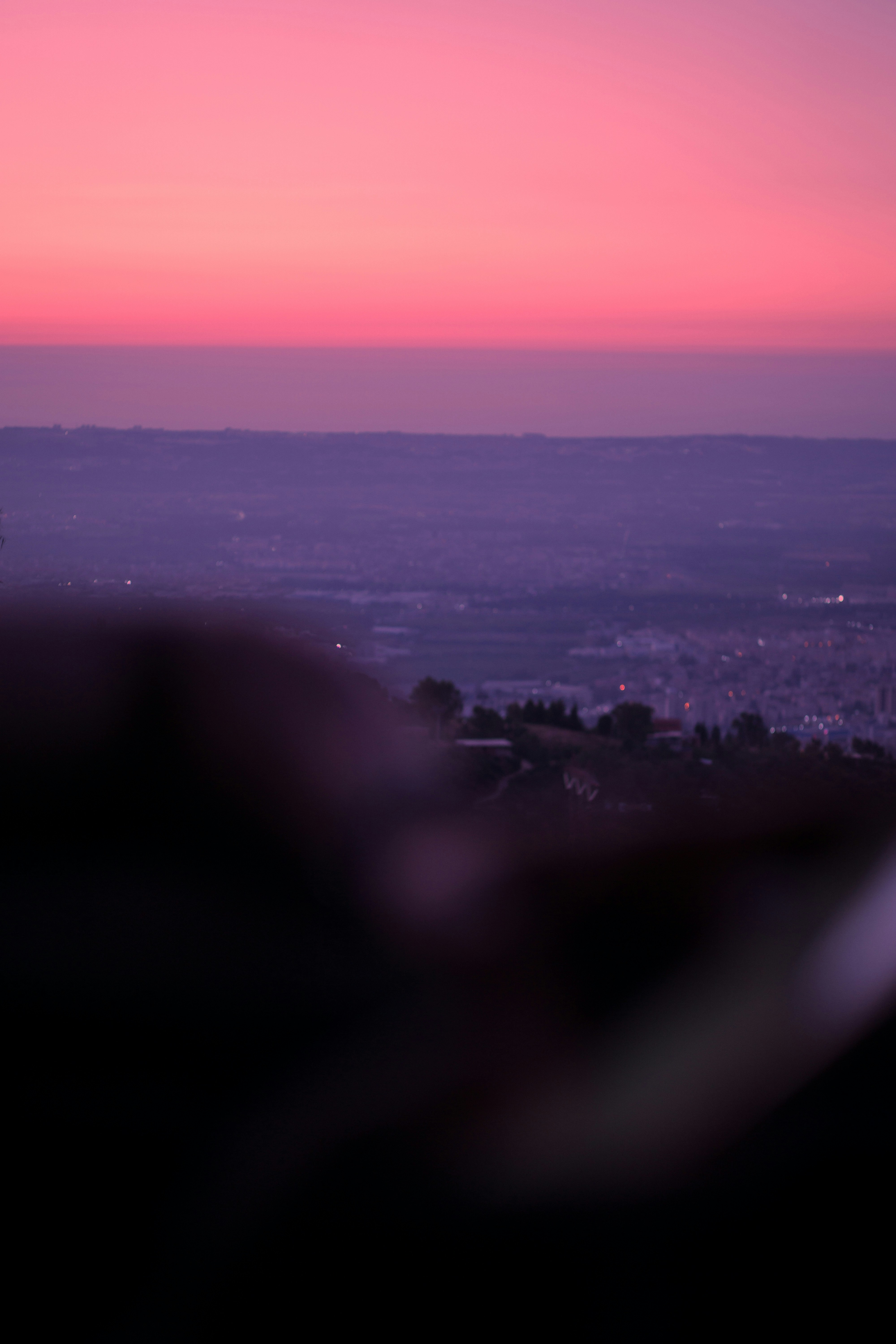 Horizon in Velvet Pink: Dusk Over the Quiet Valley
